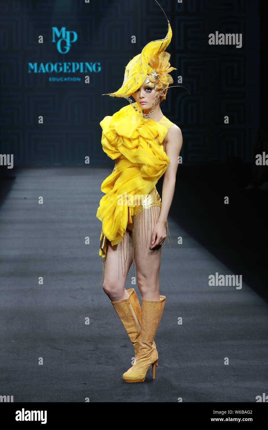 A Chinese model displays a new creation at the Maogeping Makeup Show in ...