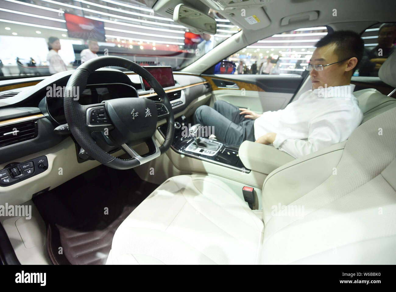 A Hongqi (Red Flag) H5 sedan of China FAW Group Corp. is on display ...