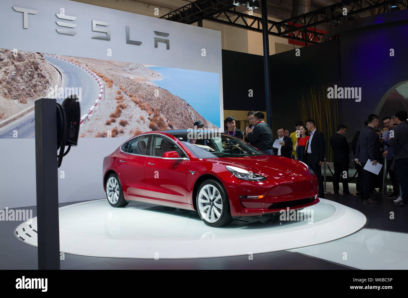 --FILE--A Tesla Model electric vehicle (EV) is on display during the ...