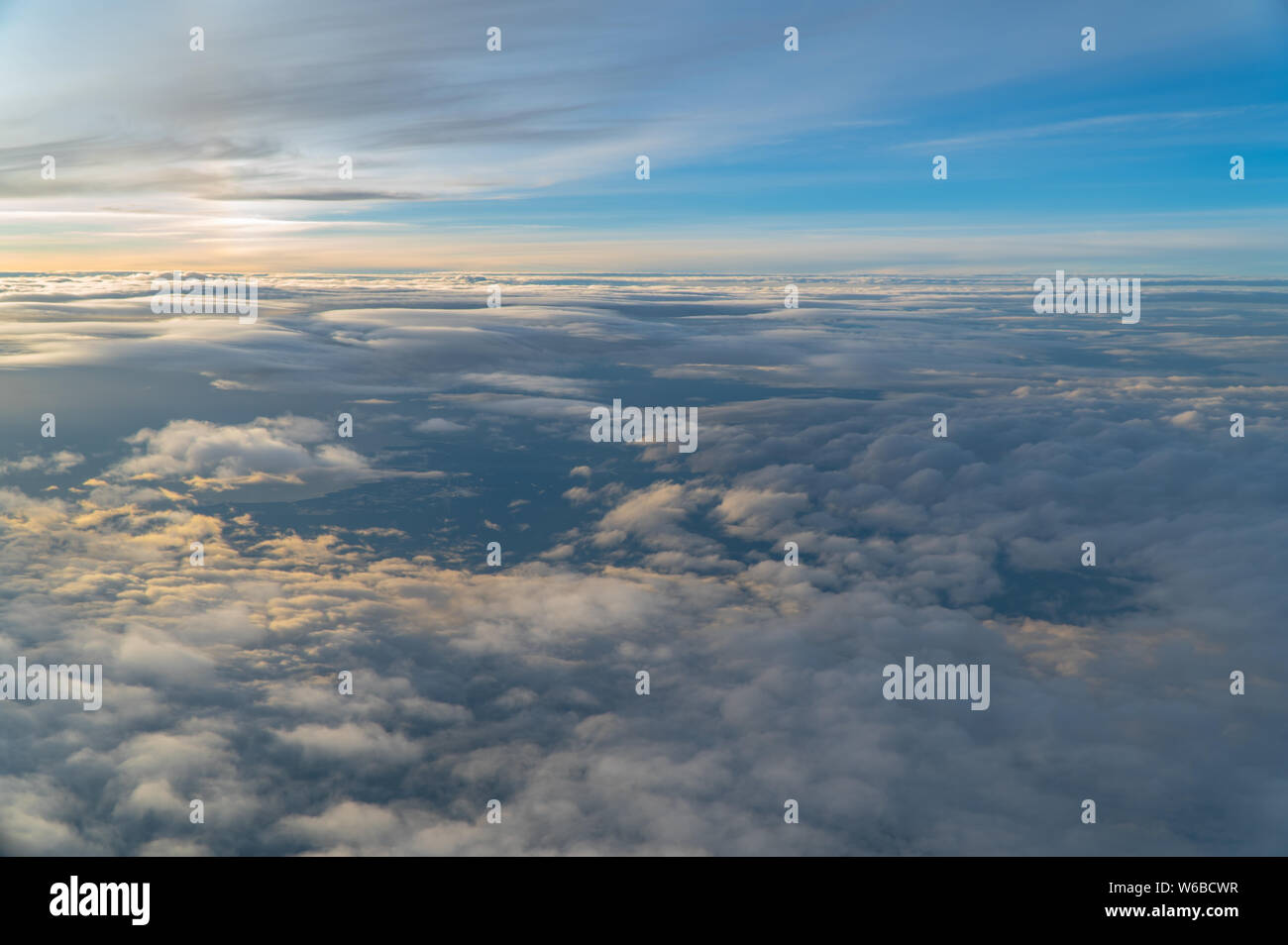 sunrise in the sky is beautiful on the atmosphere above the white ...