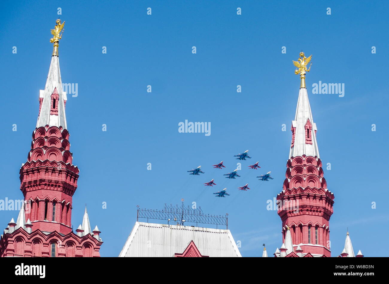 Aerobatic aircrafts of Russian Air Force perform over the Red Square ...