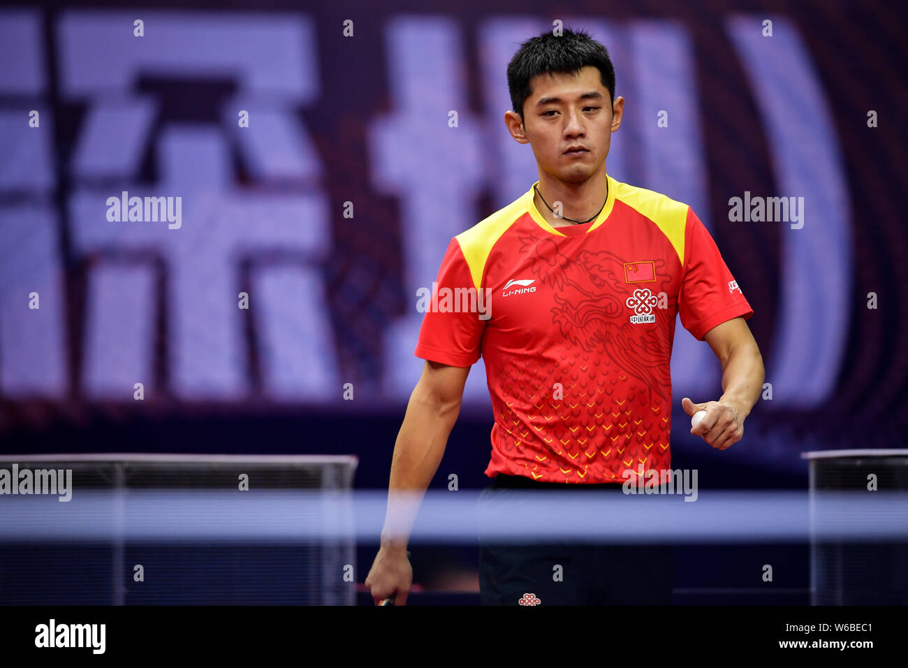 Zhang Jike of China competes against Kilian Ort of Germany in their men ...
