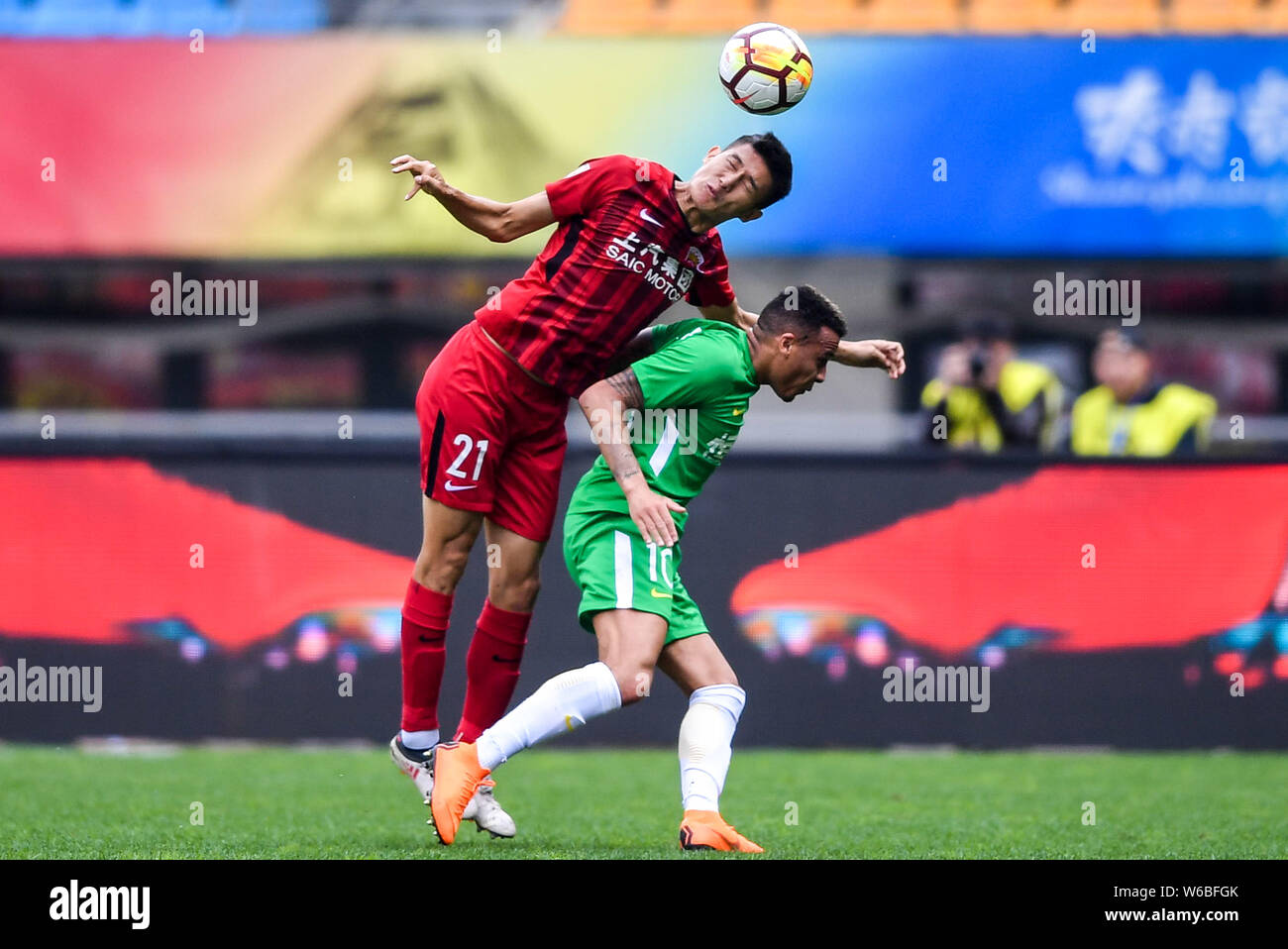 Dutch soccer player Tjaronn Chery, right, of Guizhou Hengfeng ...