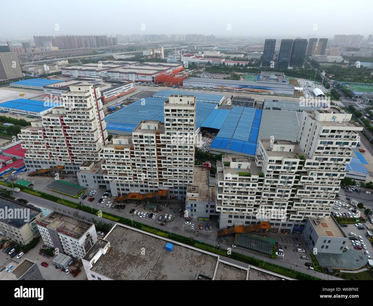 An aerial view of a residential compound resembling Tetris blocks in ...