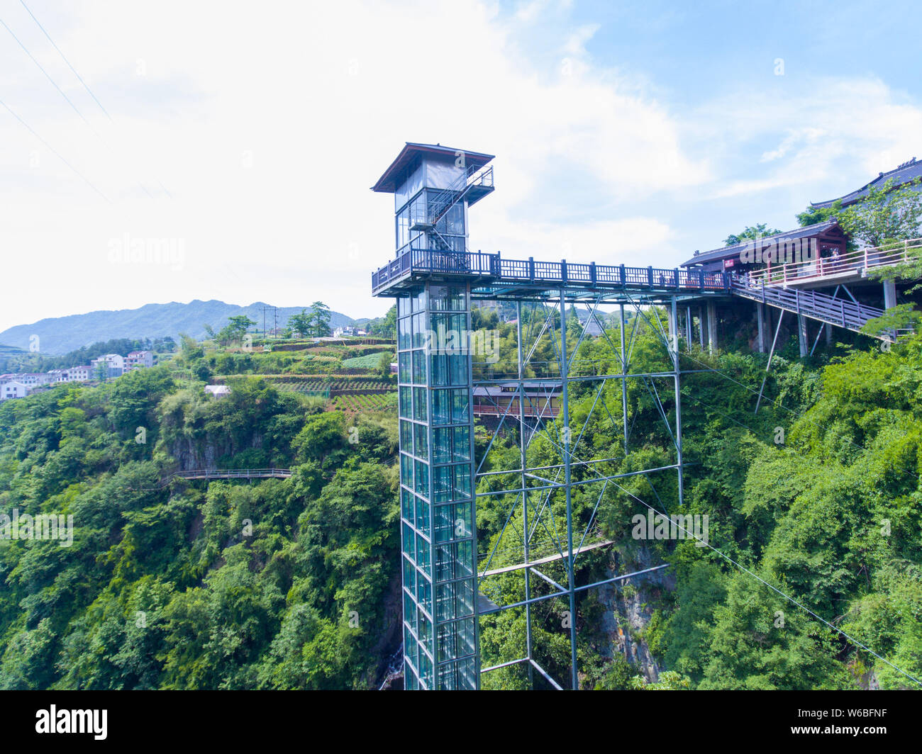 Aerial view of the 5D glass bridge at a scenic spot in Pan'an county ...