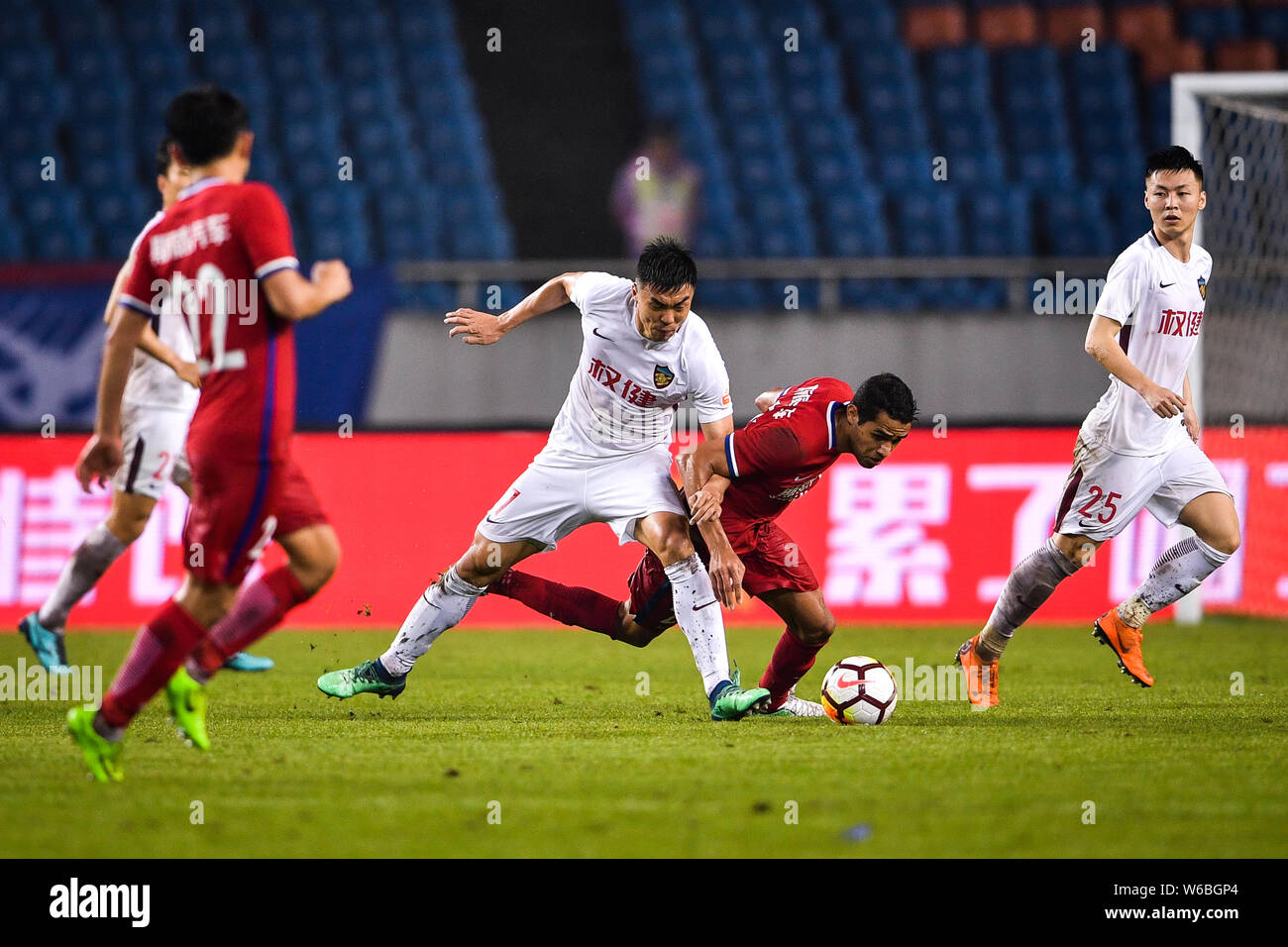 Brazilian football player Alan Kardec of Chongqing SWM, right ...