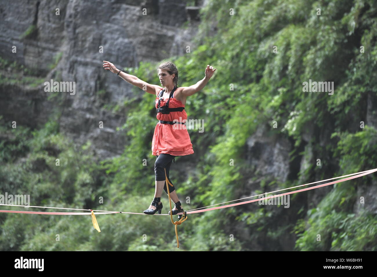 Mimi Guesdon of France participates in a slackline contest in high ...