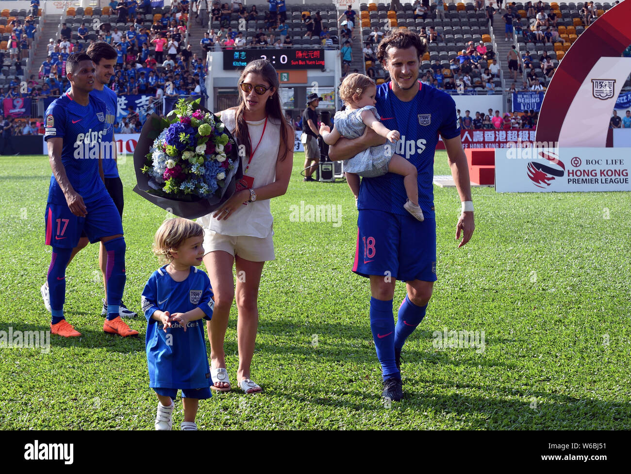 Uruguayan football player Diego Forlan, center, of Hong Kong's Kitchee ...