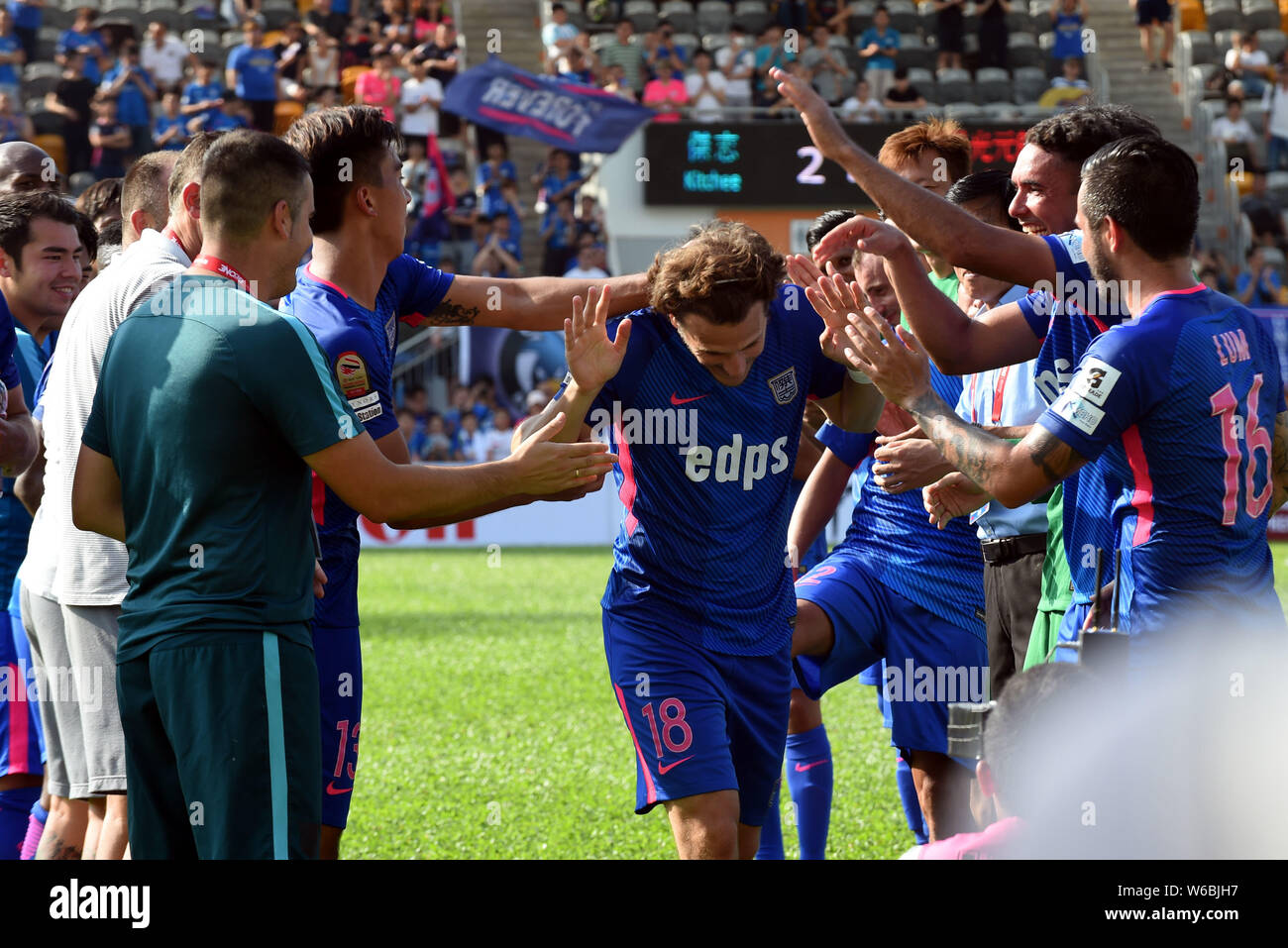 Uruguayan football player Diego Forlan, center, of Hong Kong's Kitchee ...