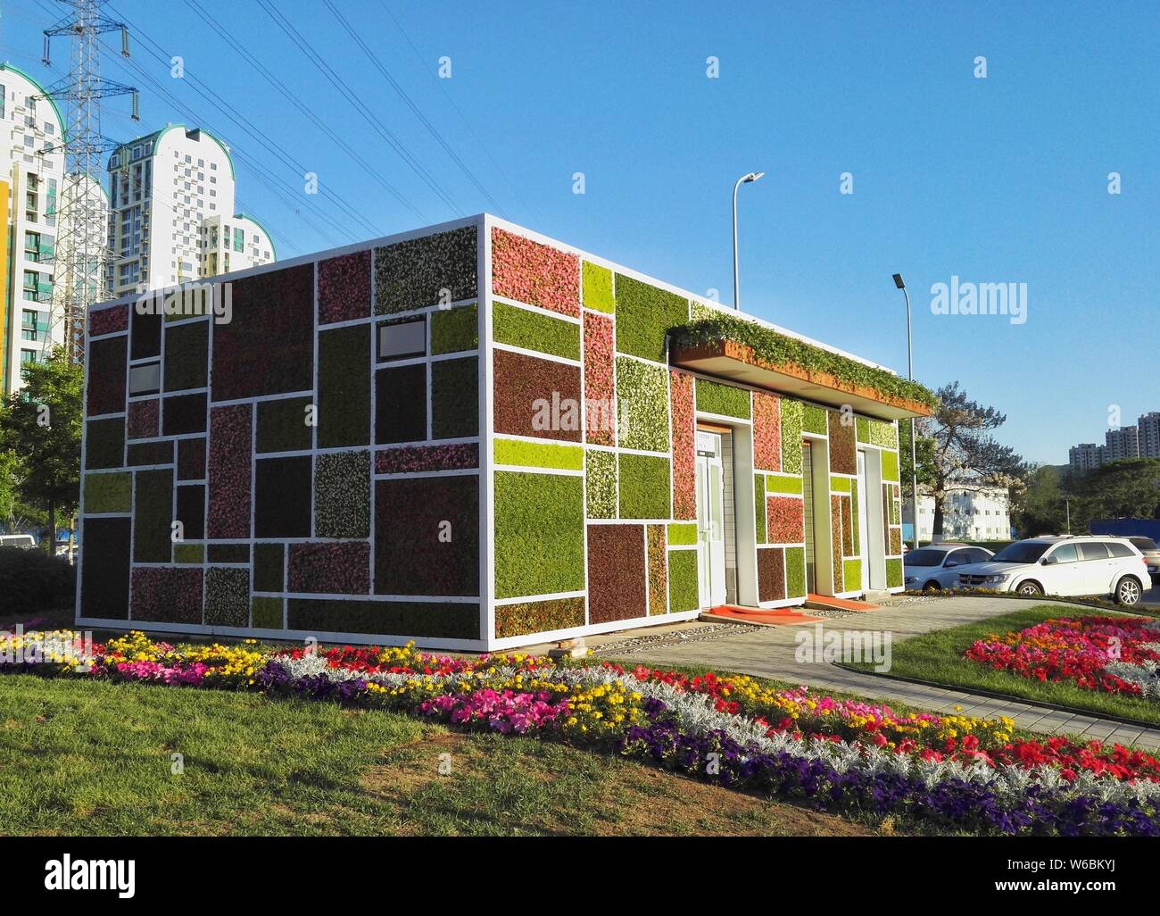 The magic cube-shaped public toilet is decorated with square-shaped ...