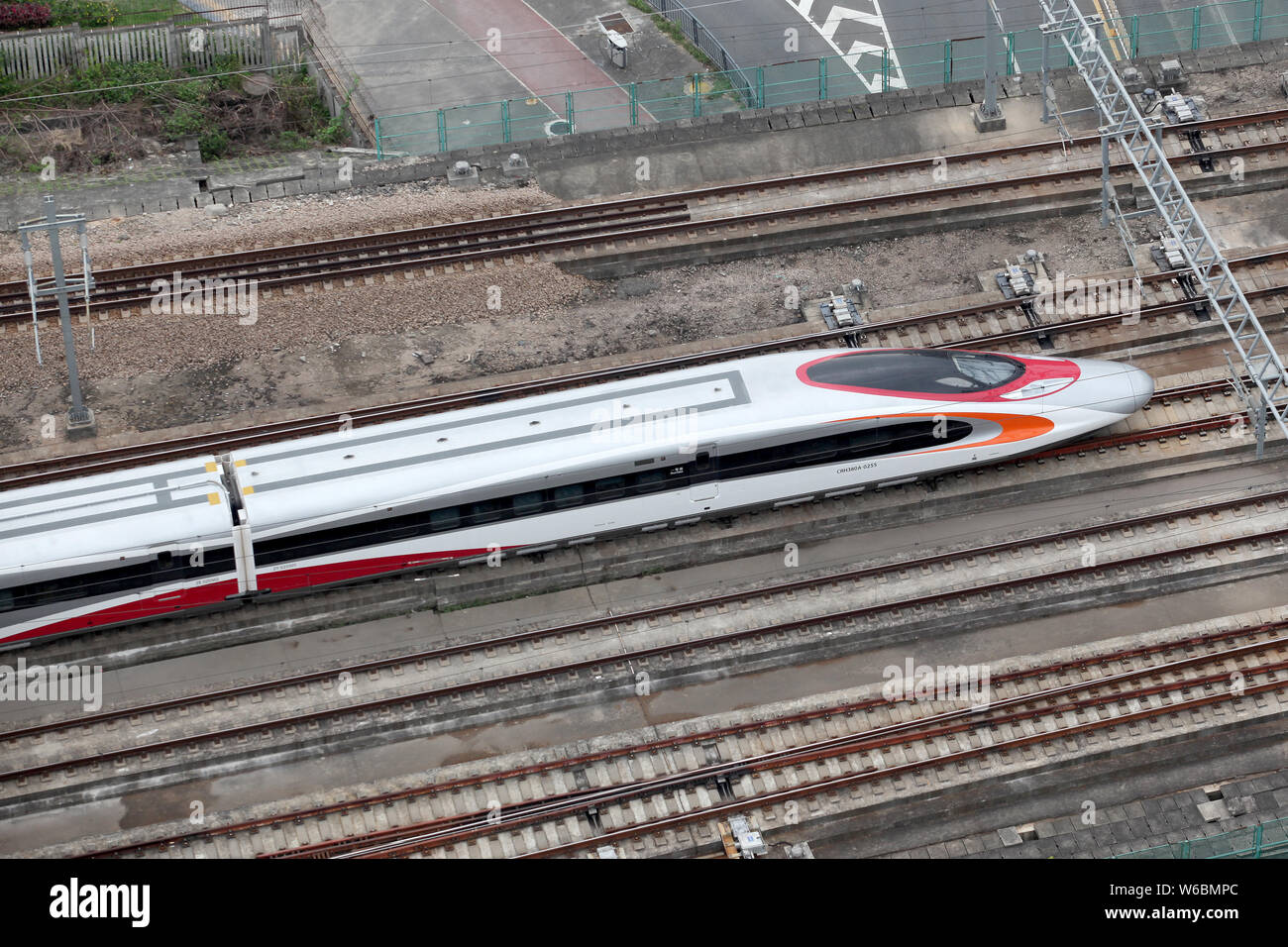 An MTR train of CRH (China Railway High-speed) runs on the Guangzhou ...