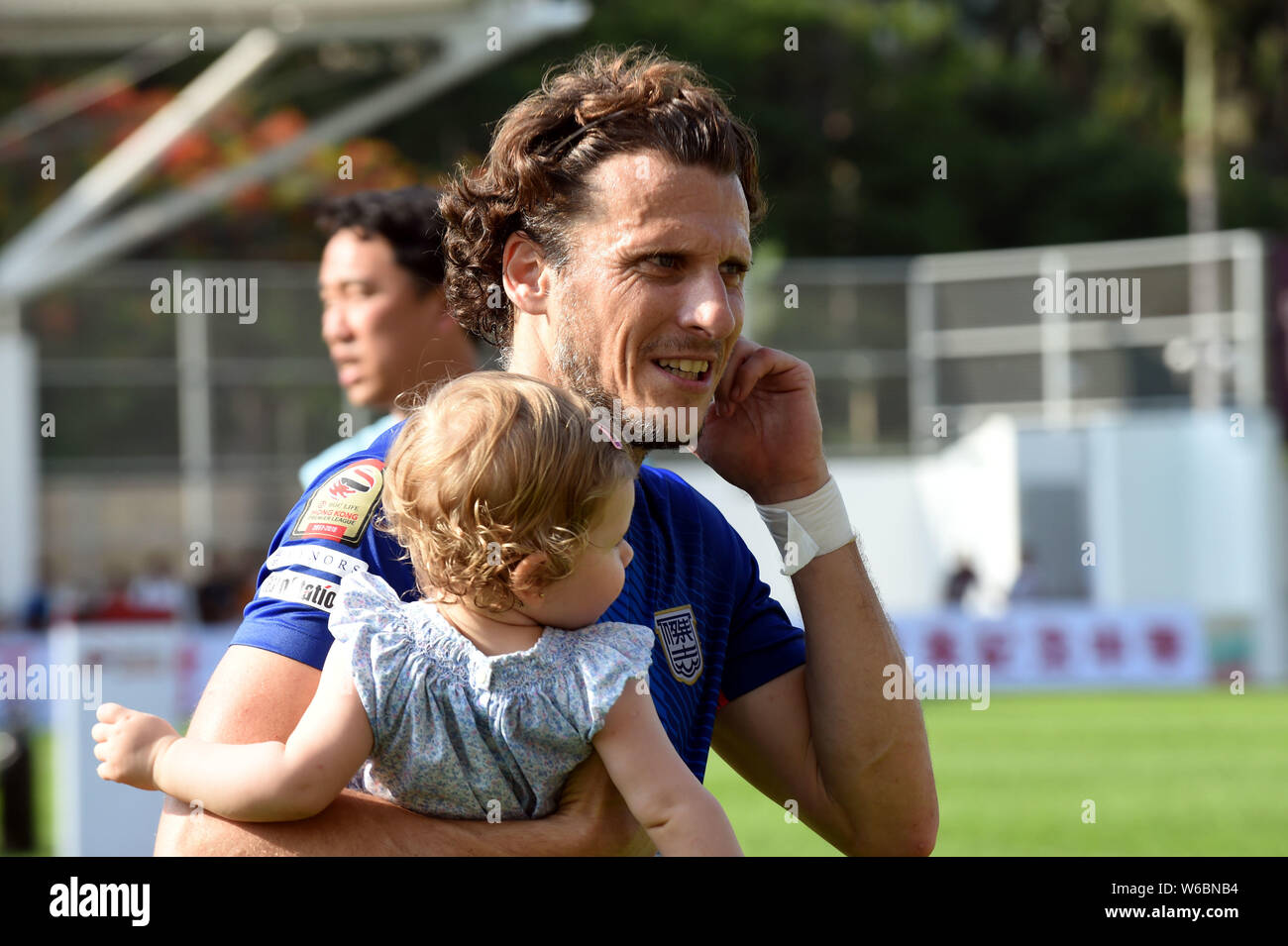 Uruguayan football player Diego Forlan, center, of Hong Kong's Kitchee ...