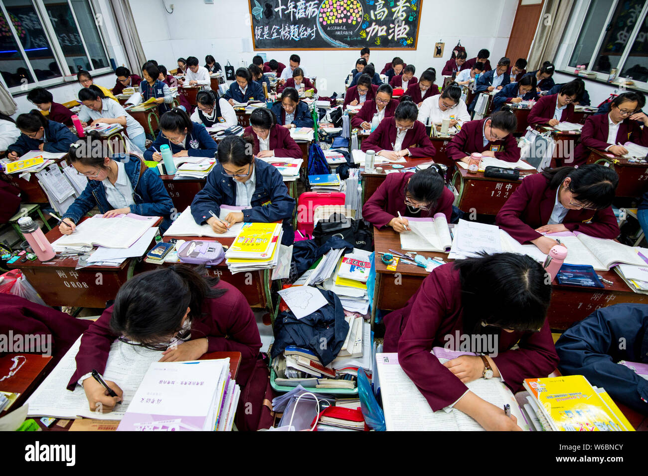 Young Chinese students prepare for the upcoming 2018 national college entrance examination, also ...