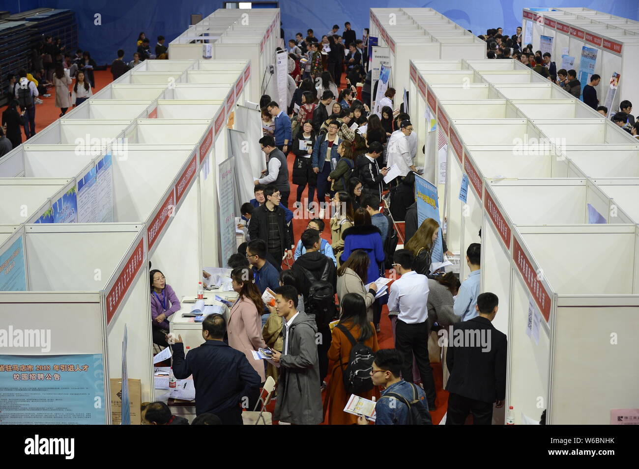--FILE--Chinese job seekers look for employment at a job fair at the ...