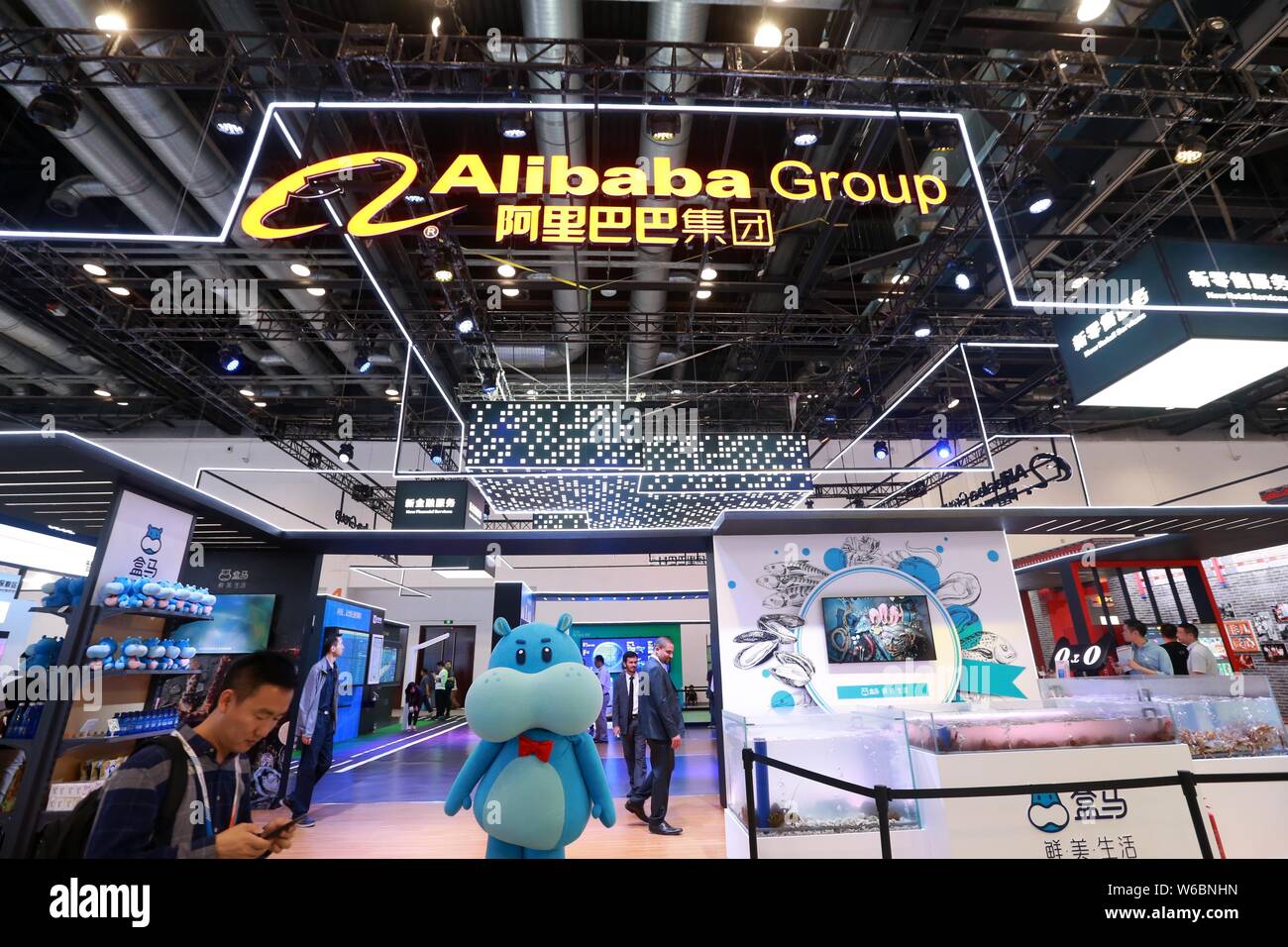 --FILE--People visit the stand of Alibaba Group during the 5th China ...