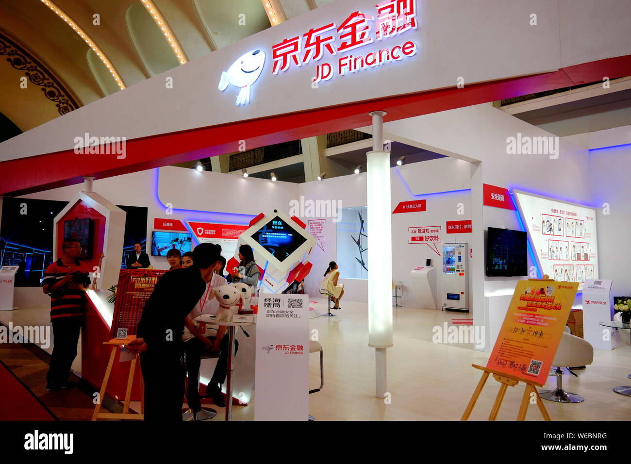 --FILE--People visit the stand of JD Finance of Chinese online retailer ...