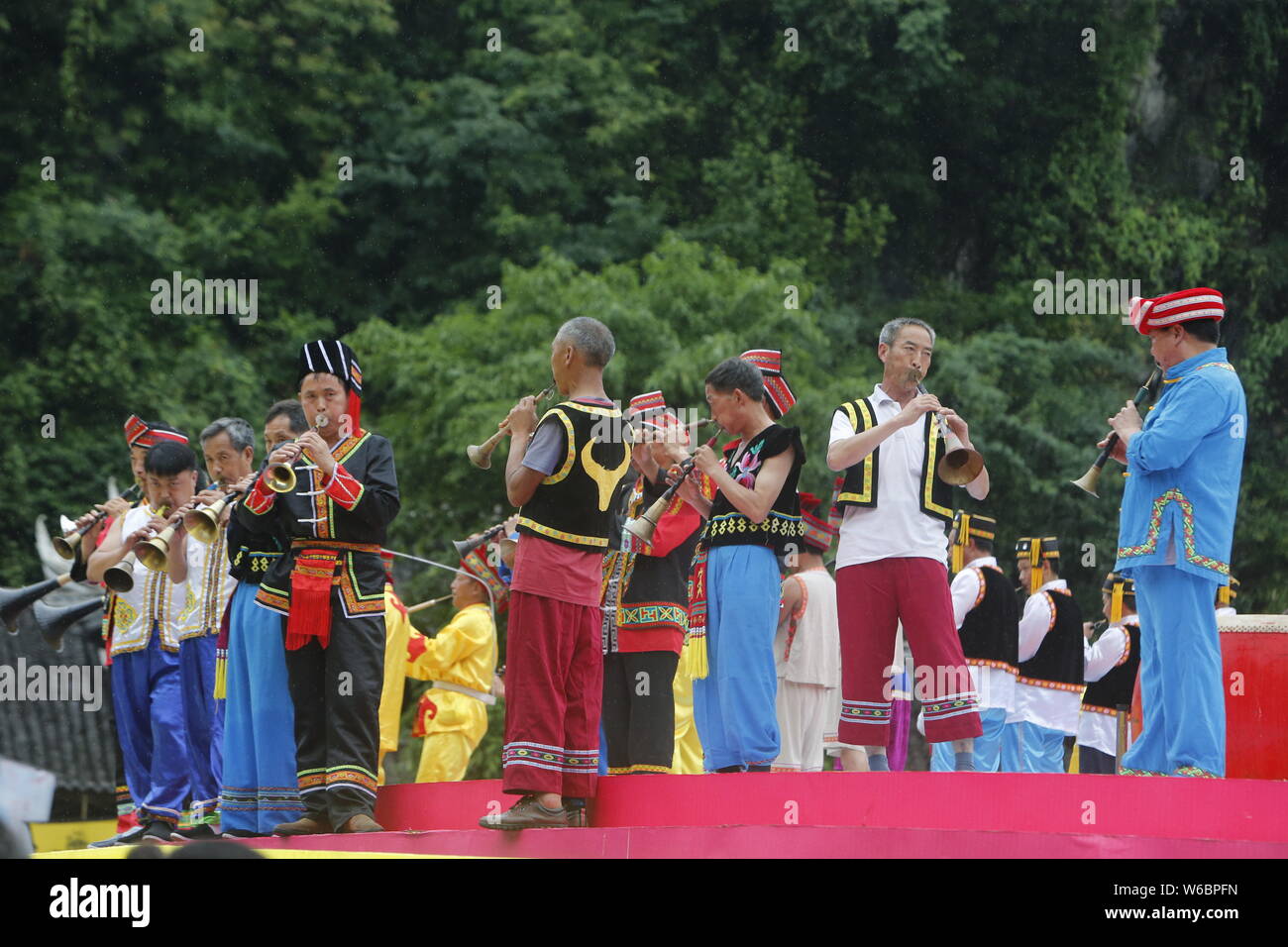 Chinese people of Miao ethnic group dressed in traditional costumes ...