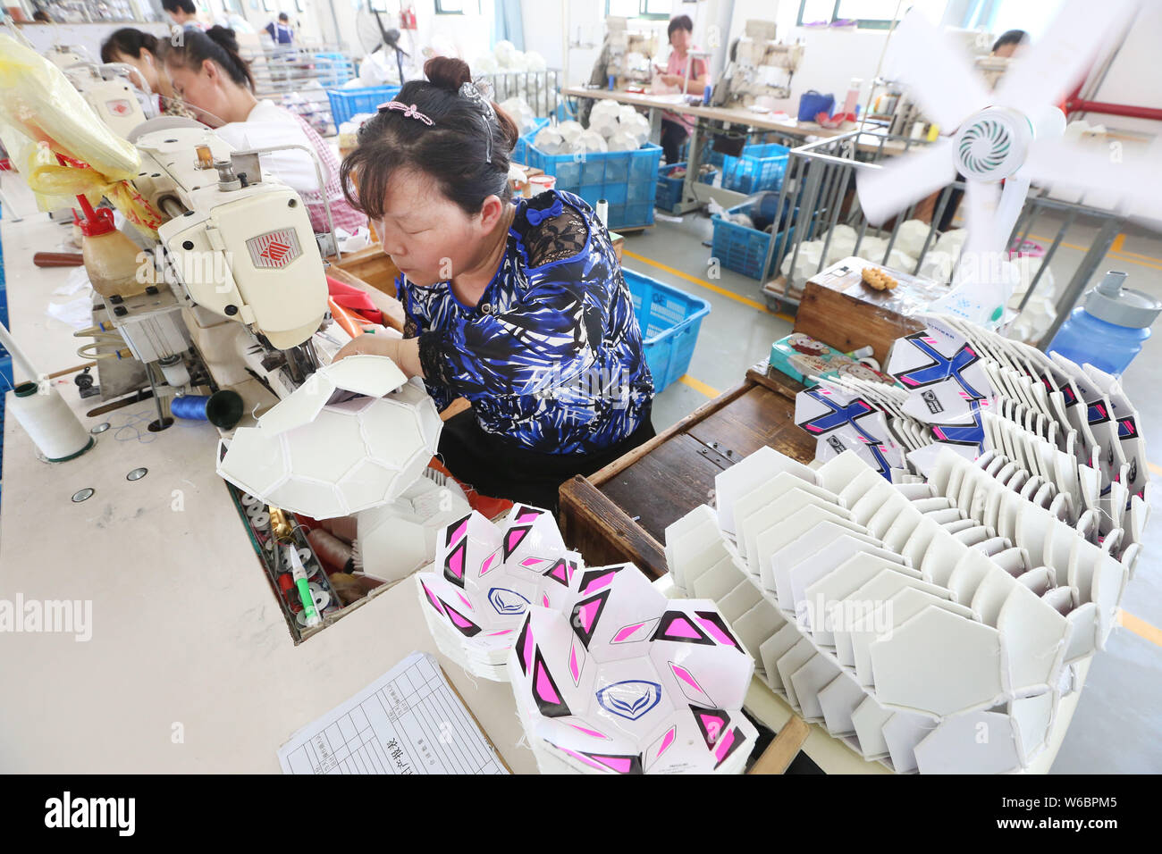 Chinese workers manufacture footballs for the 2018 FIFA World Cup at ...