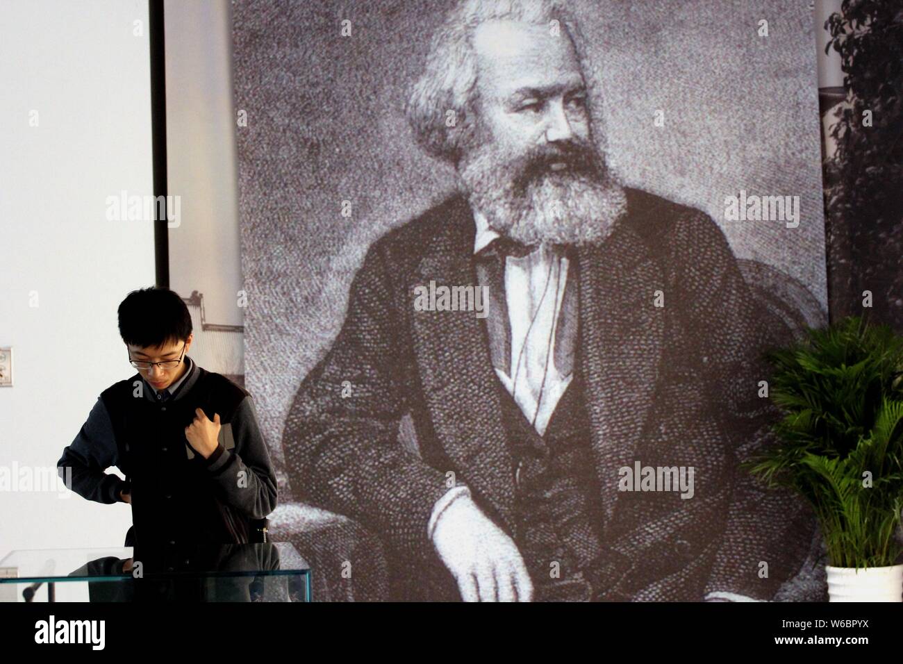 People visit an exhibition to mark the 200th anniversary of the birth ...