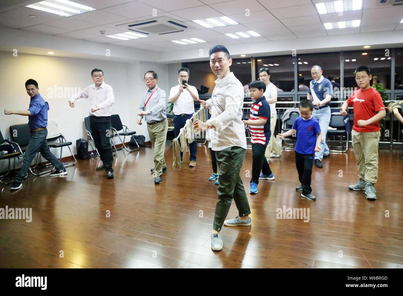 Learners practise Chinese Beijing Opera or Peking Opera with the help ...