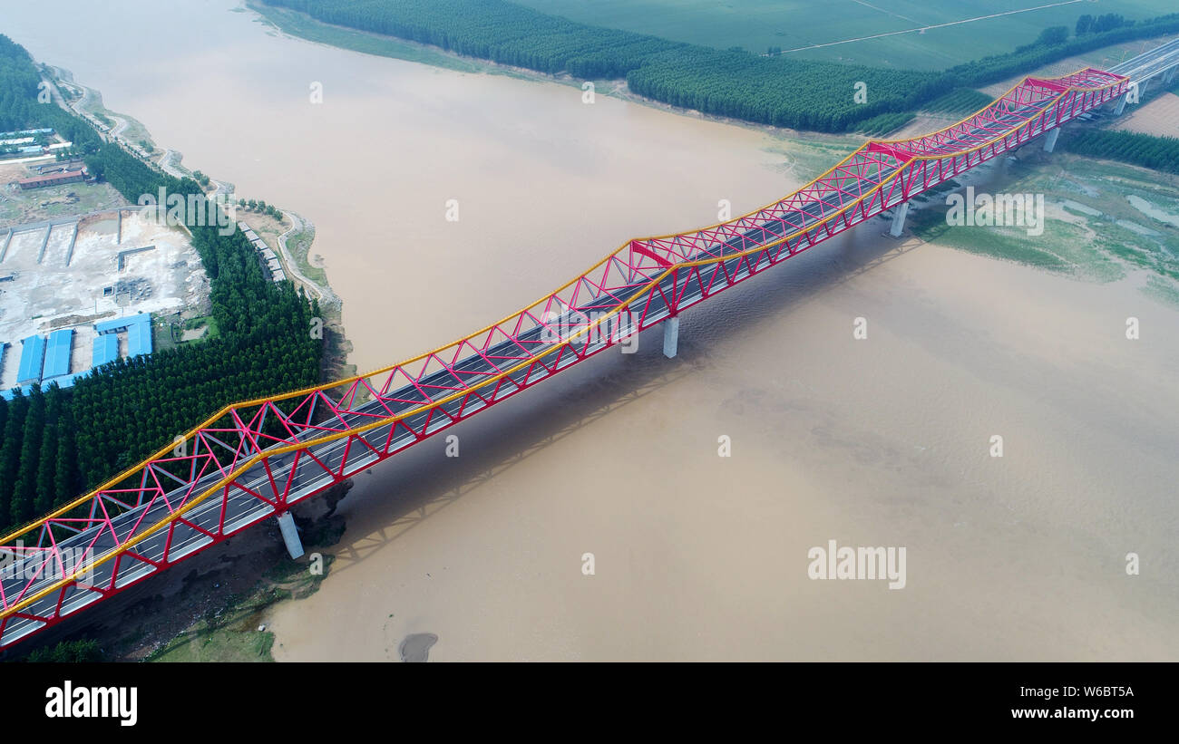 Aerial view of the Changqing Yellow River Highway Bridge in Ji'nan city ...