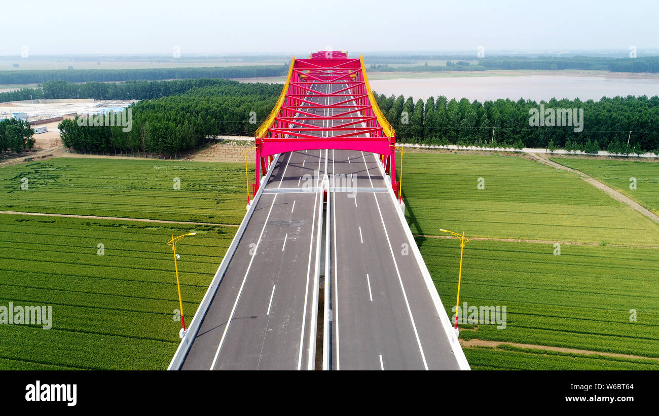 Aerial view of the Changqing Yellow River Highway Bridge in Ji'nan city ...