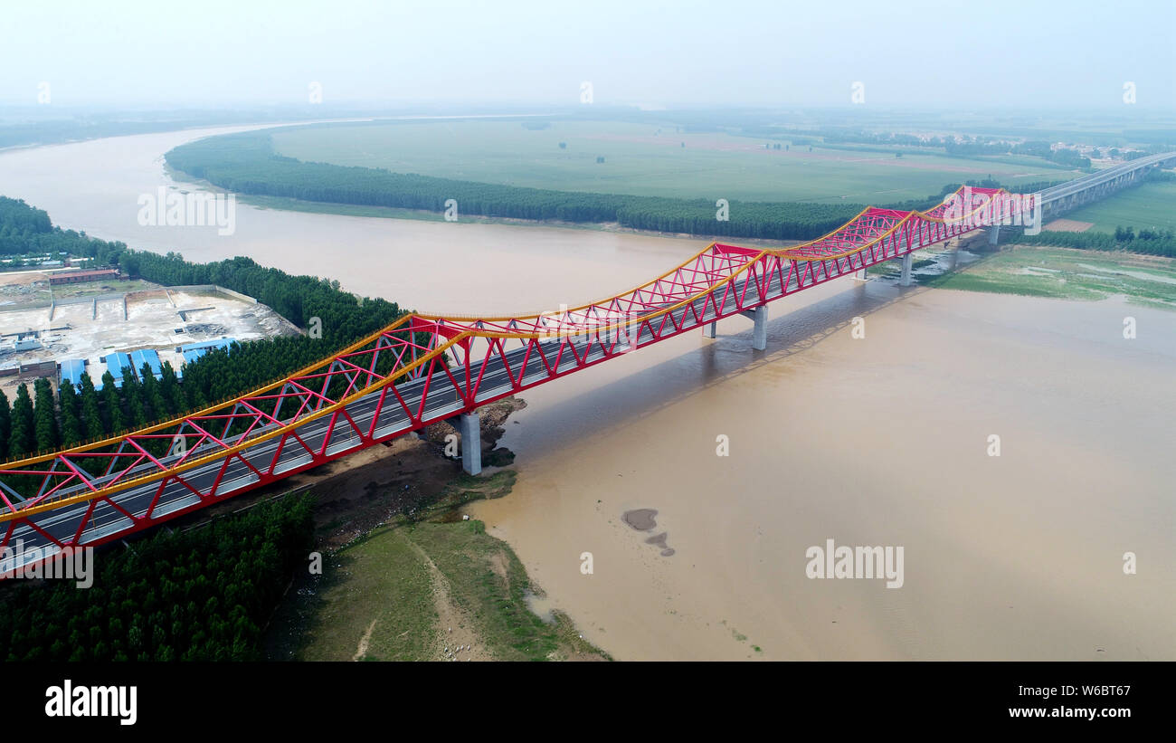 Aerial view of the Changqing Yellow River Highway Bridge in Ji'nan city ...
