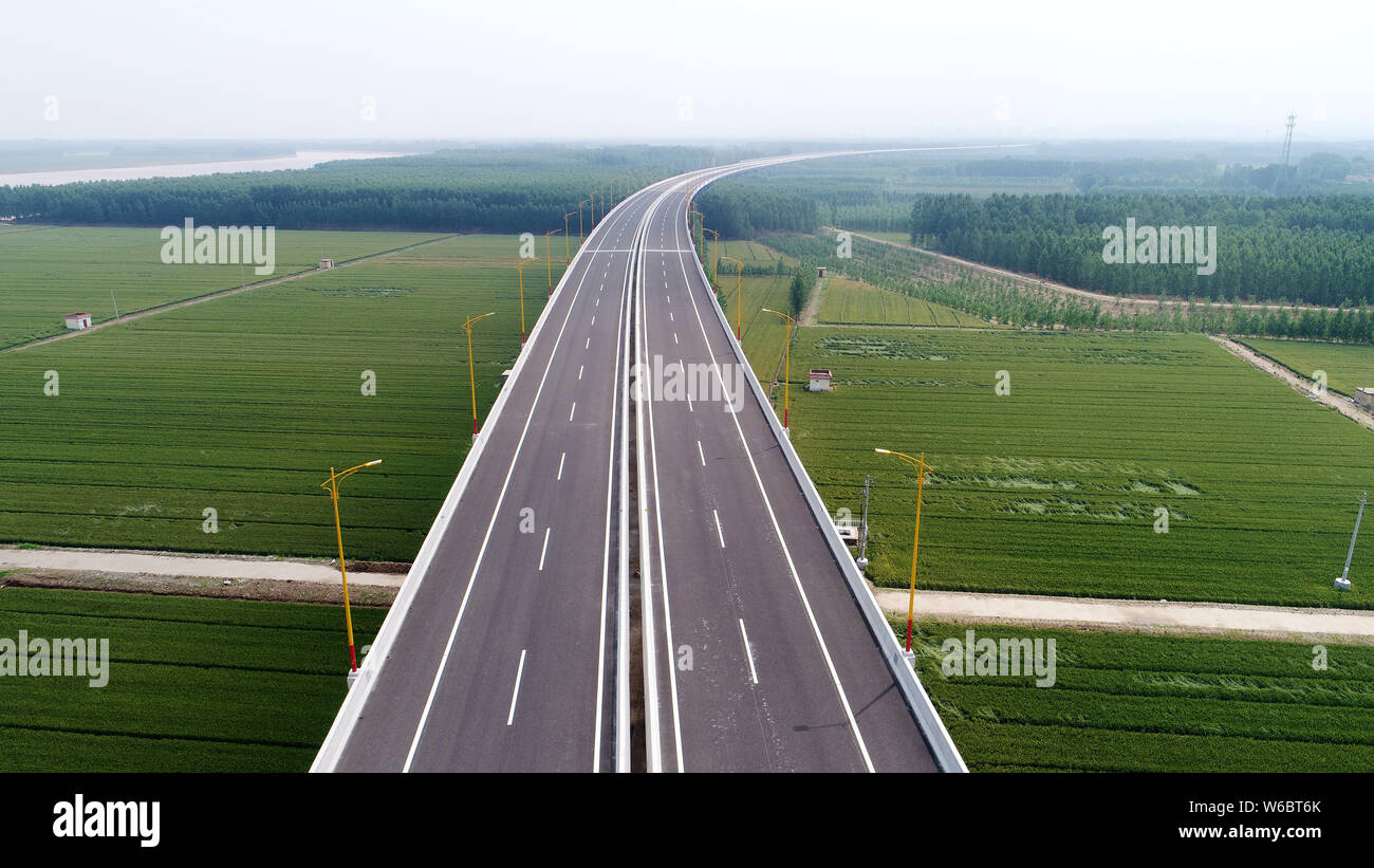 Aerial view of the Changqing Yellow River Highway Bridge in Ji'nan city ...