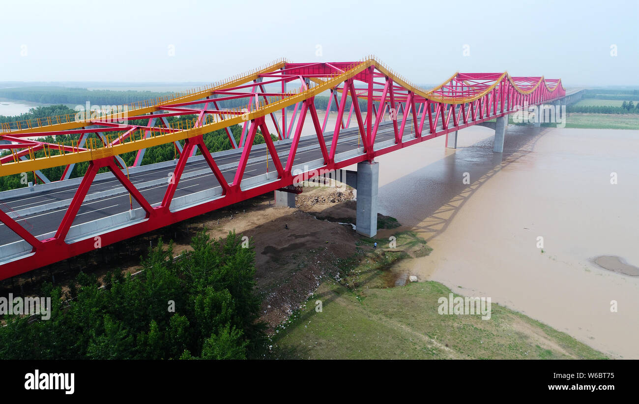 Aerial view of the Changqing Yellow River Highway Bridge in Ji'nan city ...