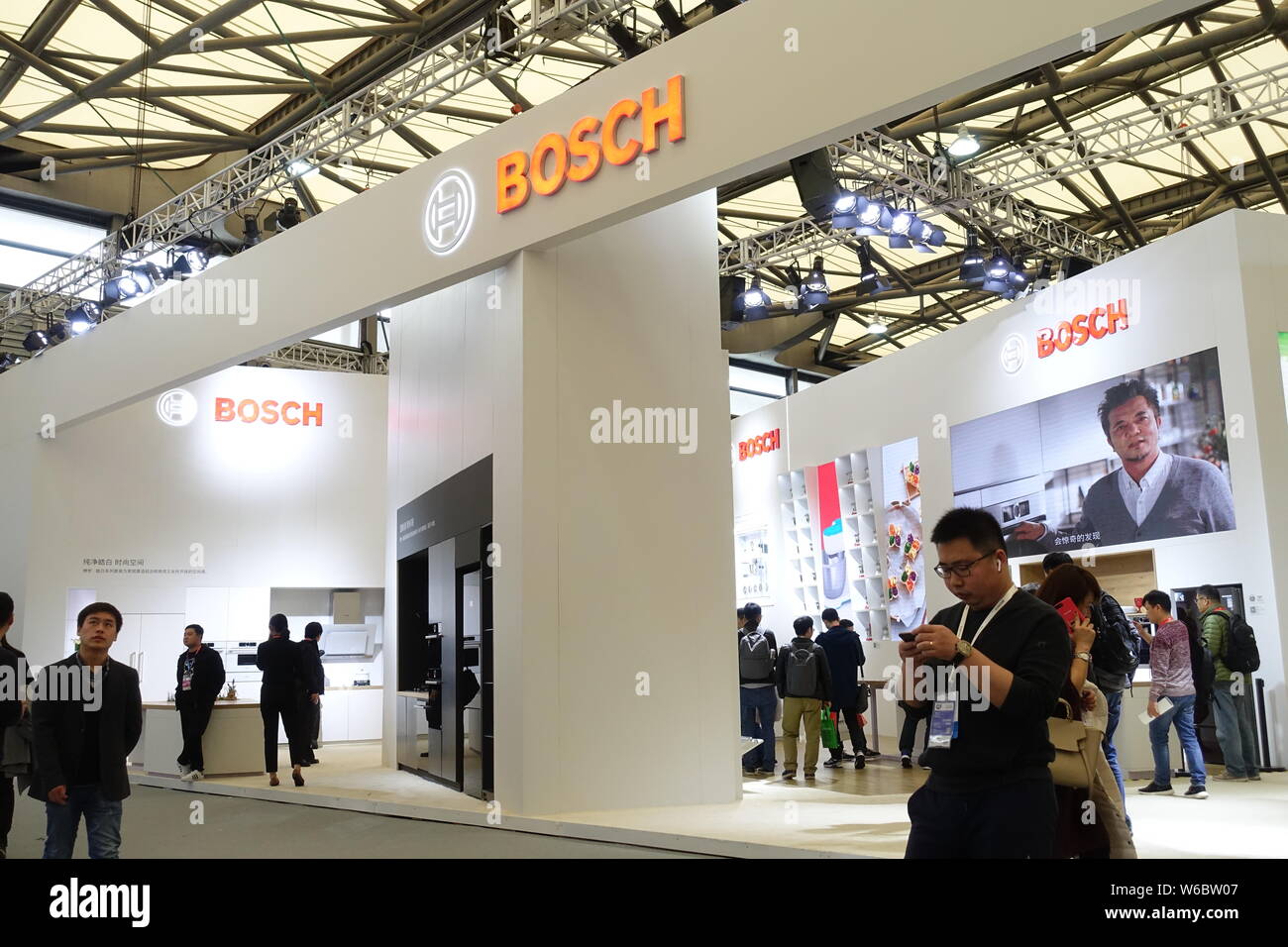--FILE--People visit the stand of Bosch during an expo in Shanghai ...