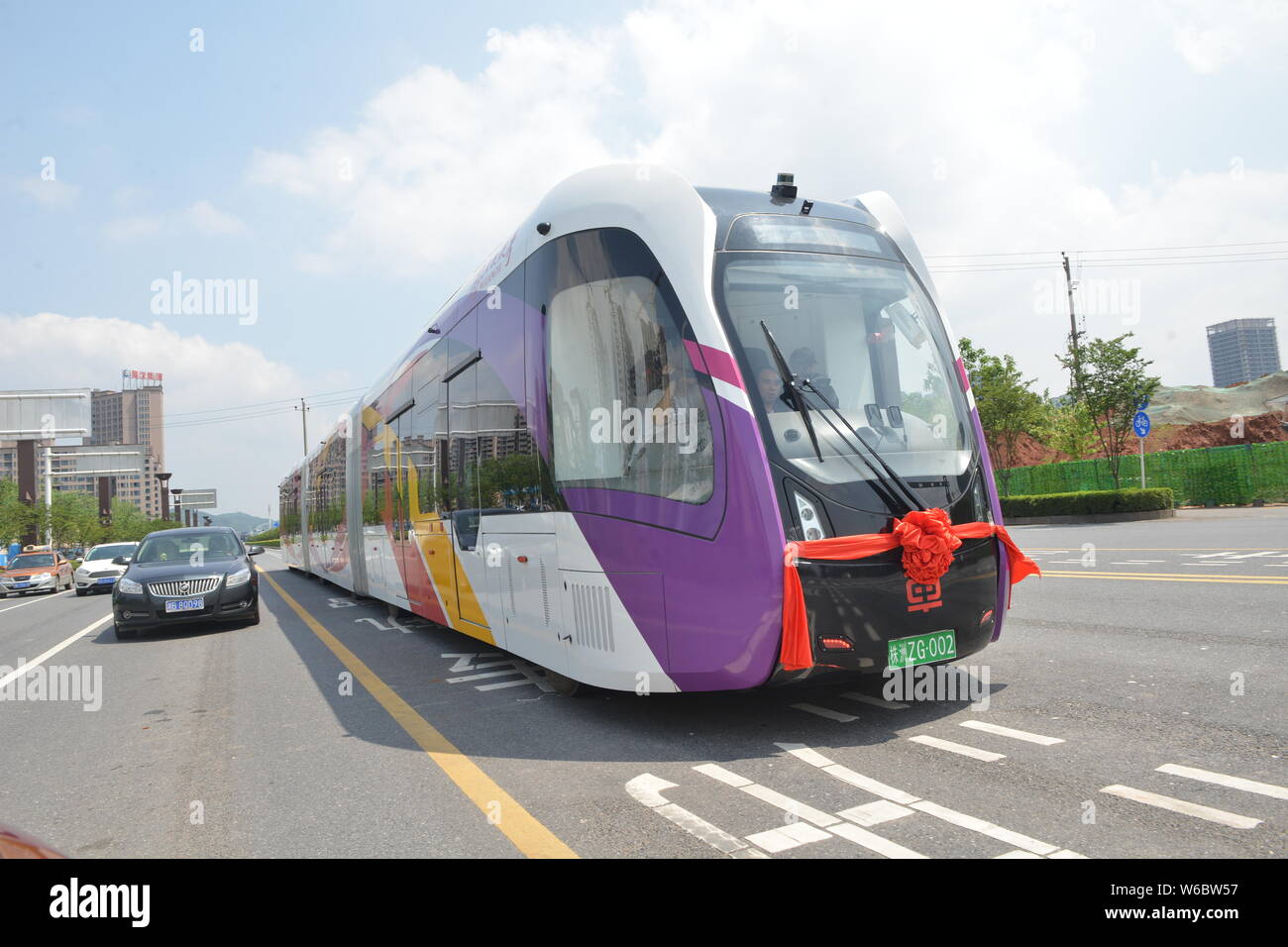 A railless train, developed by the CRRC Zhuzhou Institute Co. Ltd, runs ...