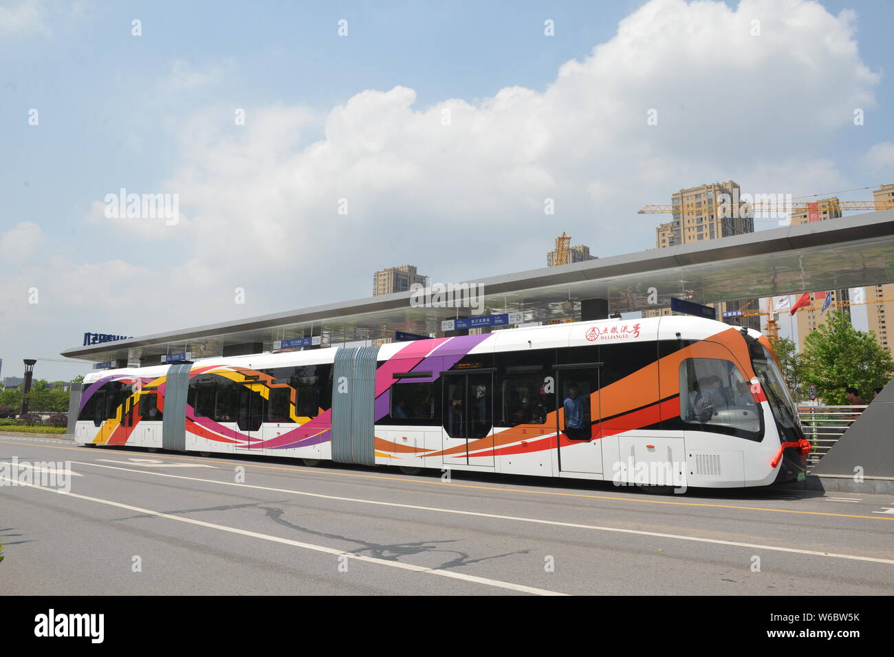 A railless train, developed by the CRRC Zhuzhou Institute Co. Ltd, runs ...