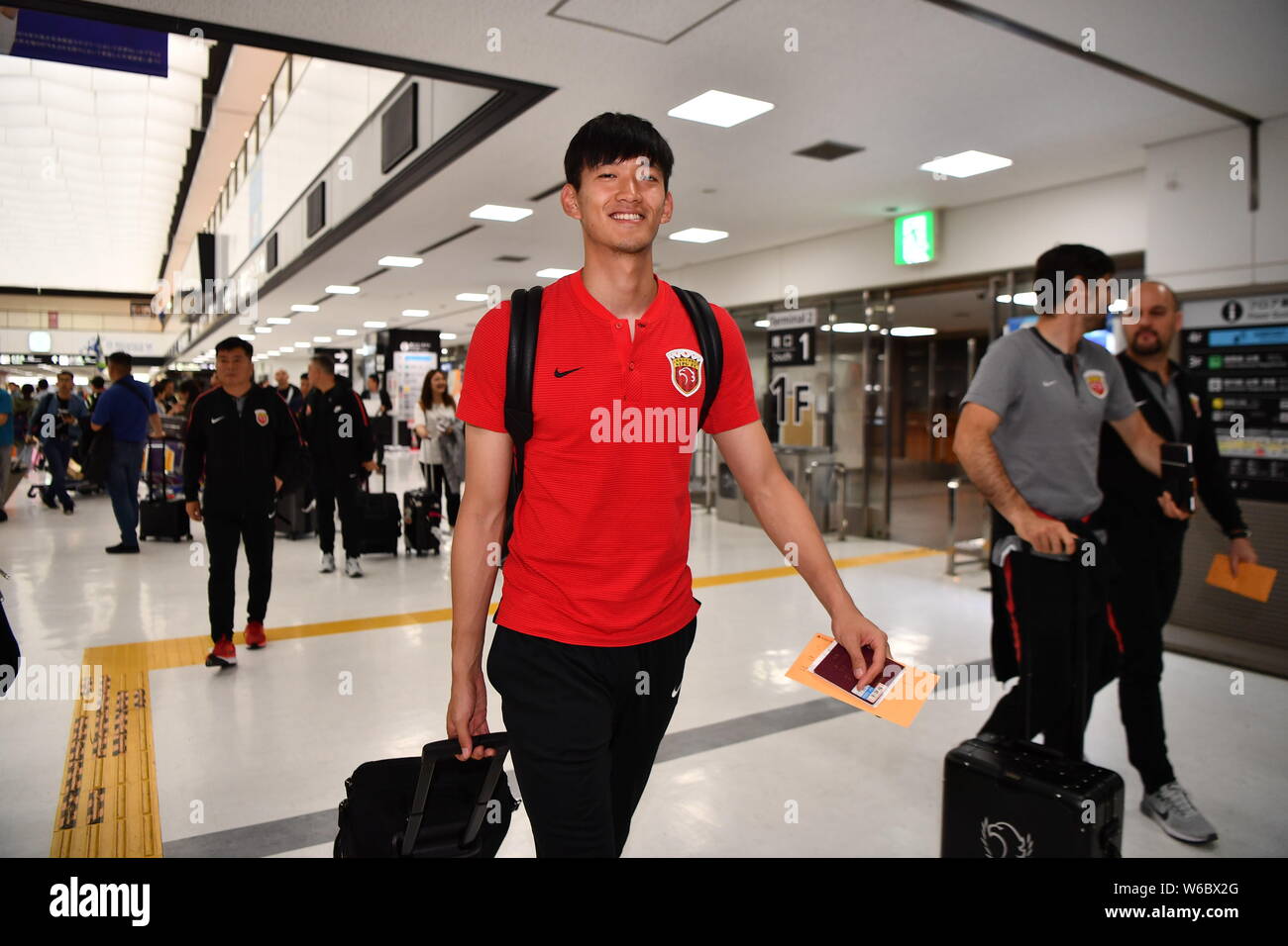 Yan Junling of China's Shanghai SIPG F.C. is pictured after arriving at ...
