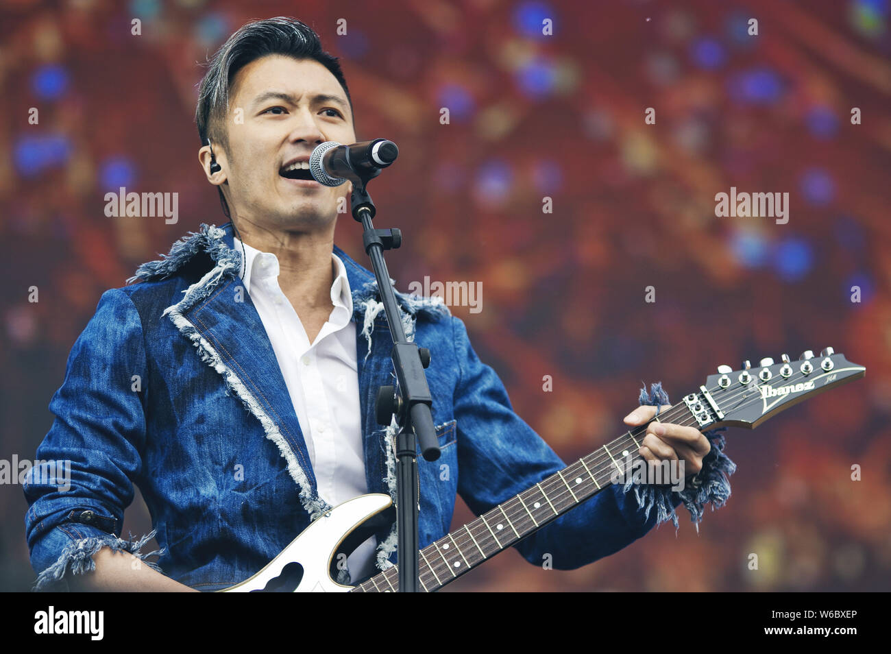 Hong Kong singer Nicholas Tse performs at the country's first Grammy ...