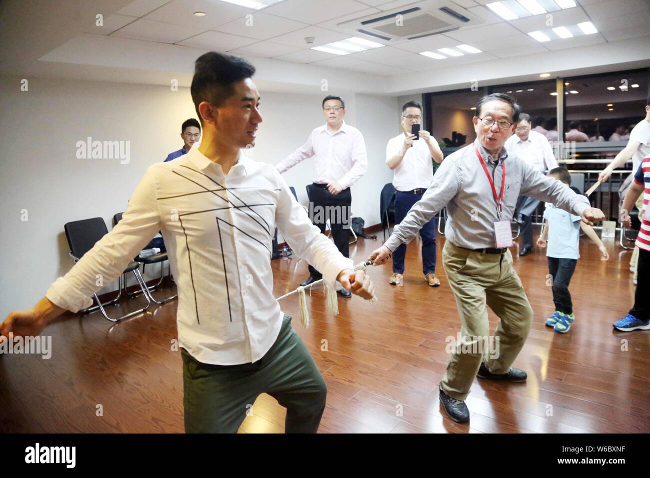 Learners practise Chinese Beijing Opera or Peking Opera with the help ...
