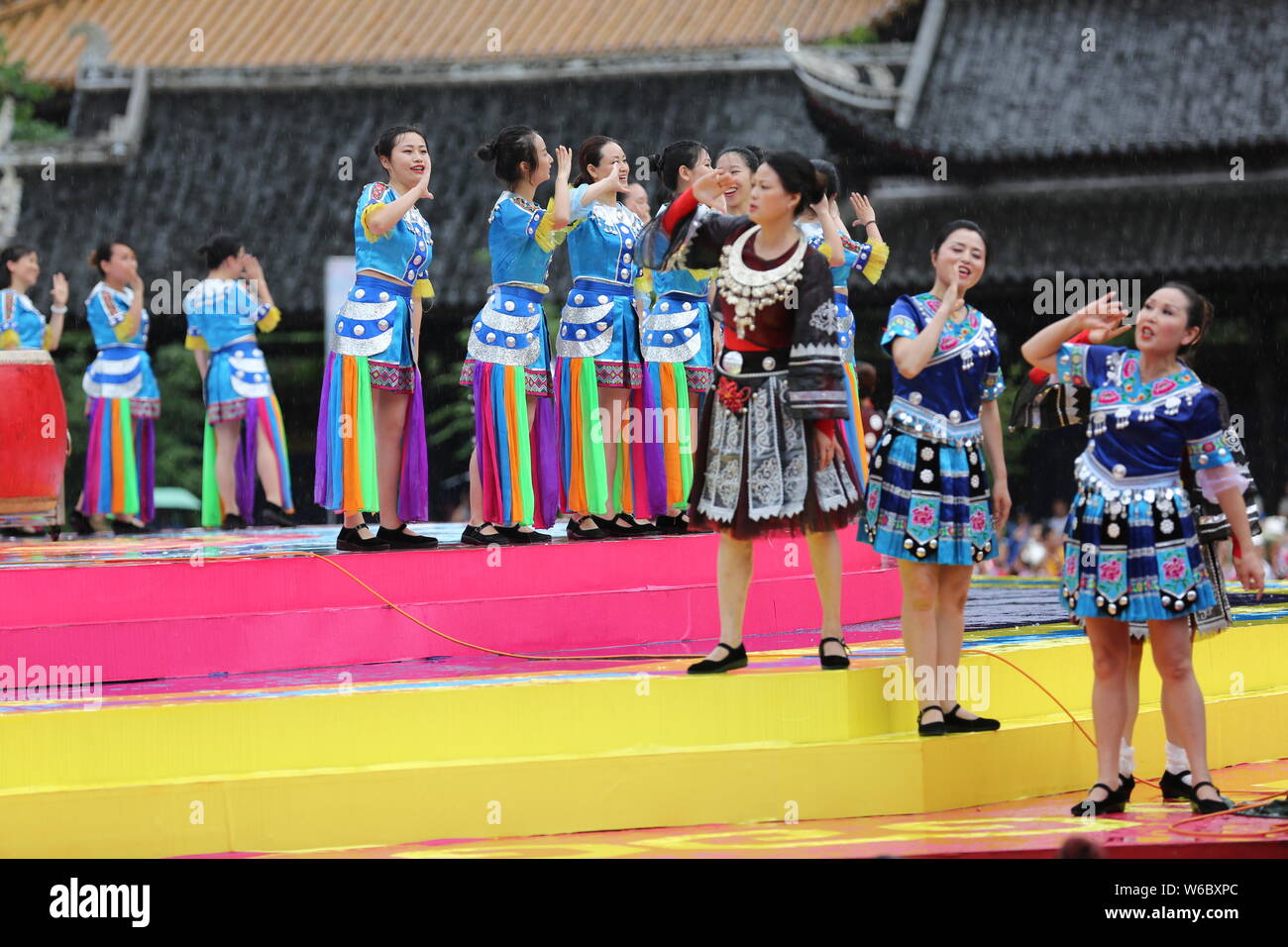 Chinese people of Miao ethnic group dressed in traditional costumes ...