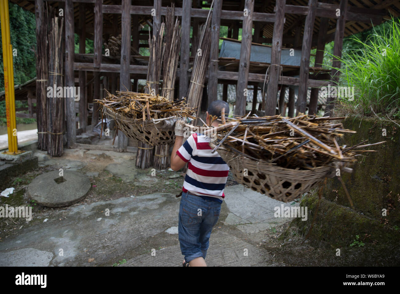 Chinese craftsman Hu Zongliang makes joss paper made of bamboo fibre in ...