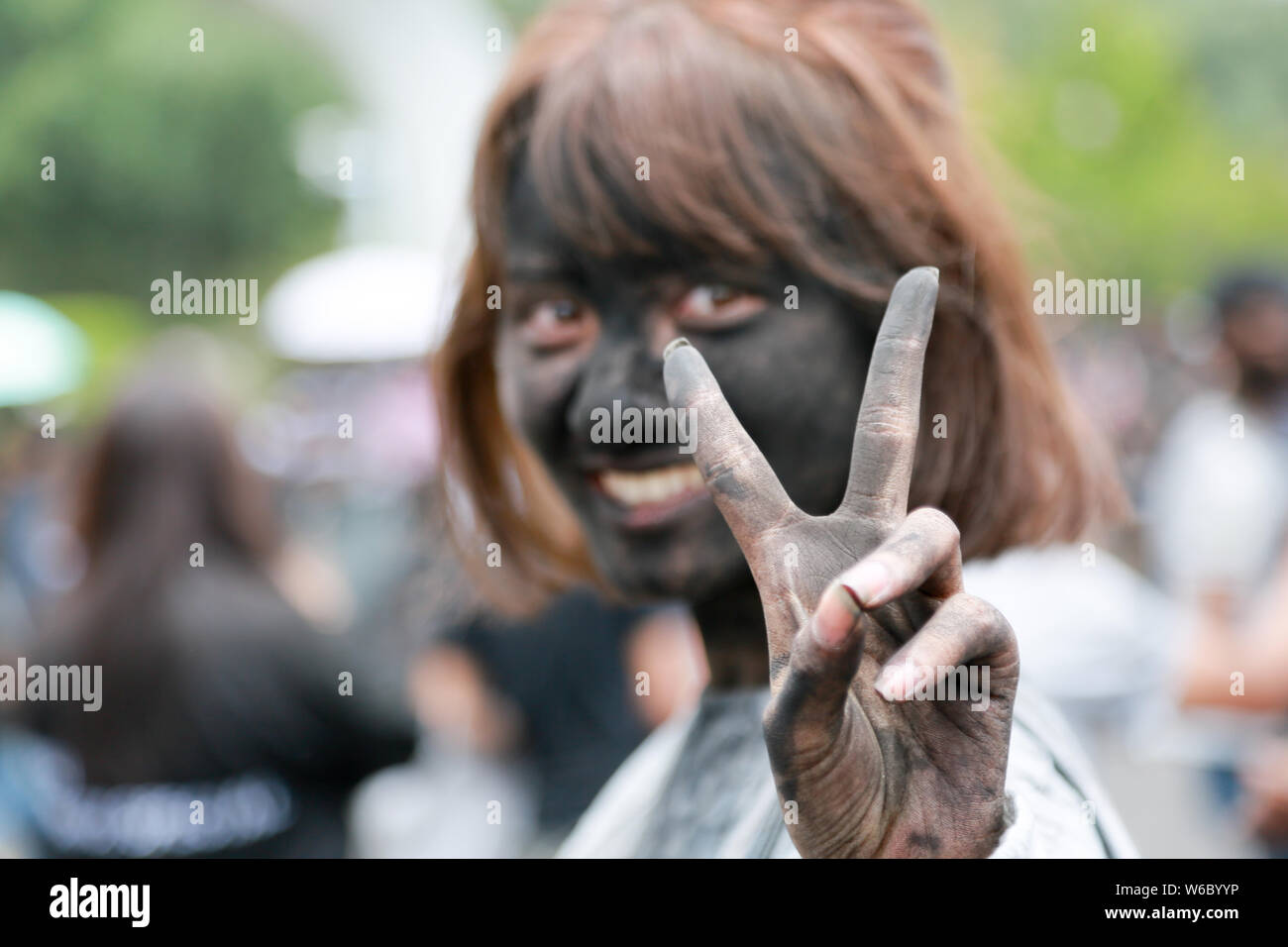 Face covered in ash hi-res stock photography and images - Alamy