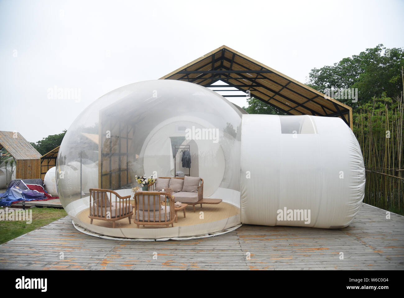 One of the 12 see-through inflatable bubble rooms is set up at a bubble ...