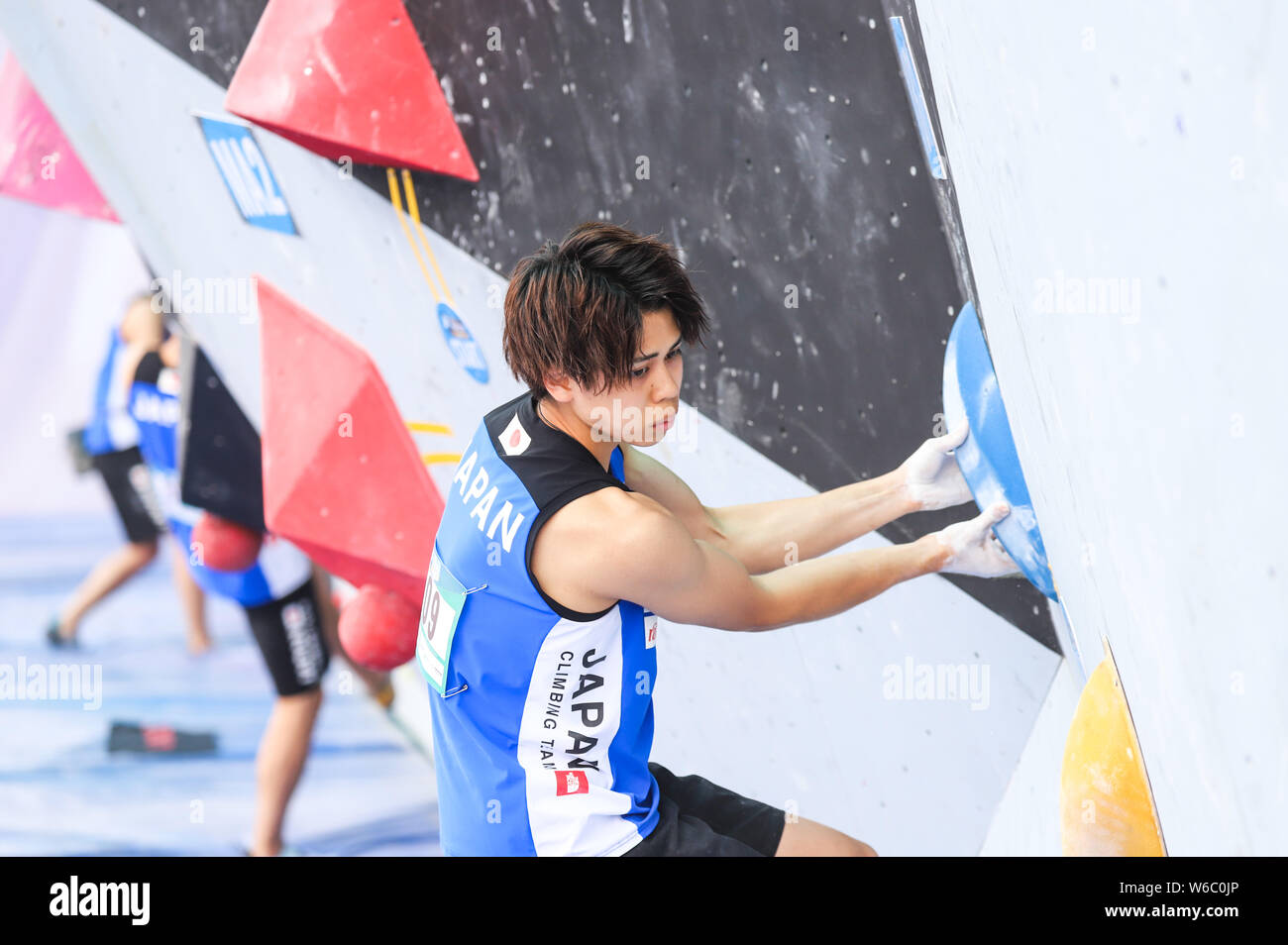Kai Harada of Japan competes in the men bouldering qualification match ...