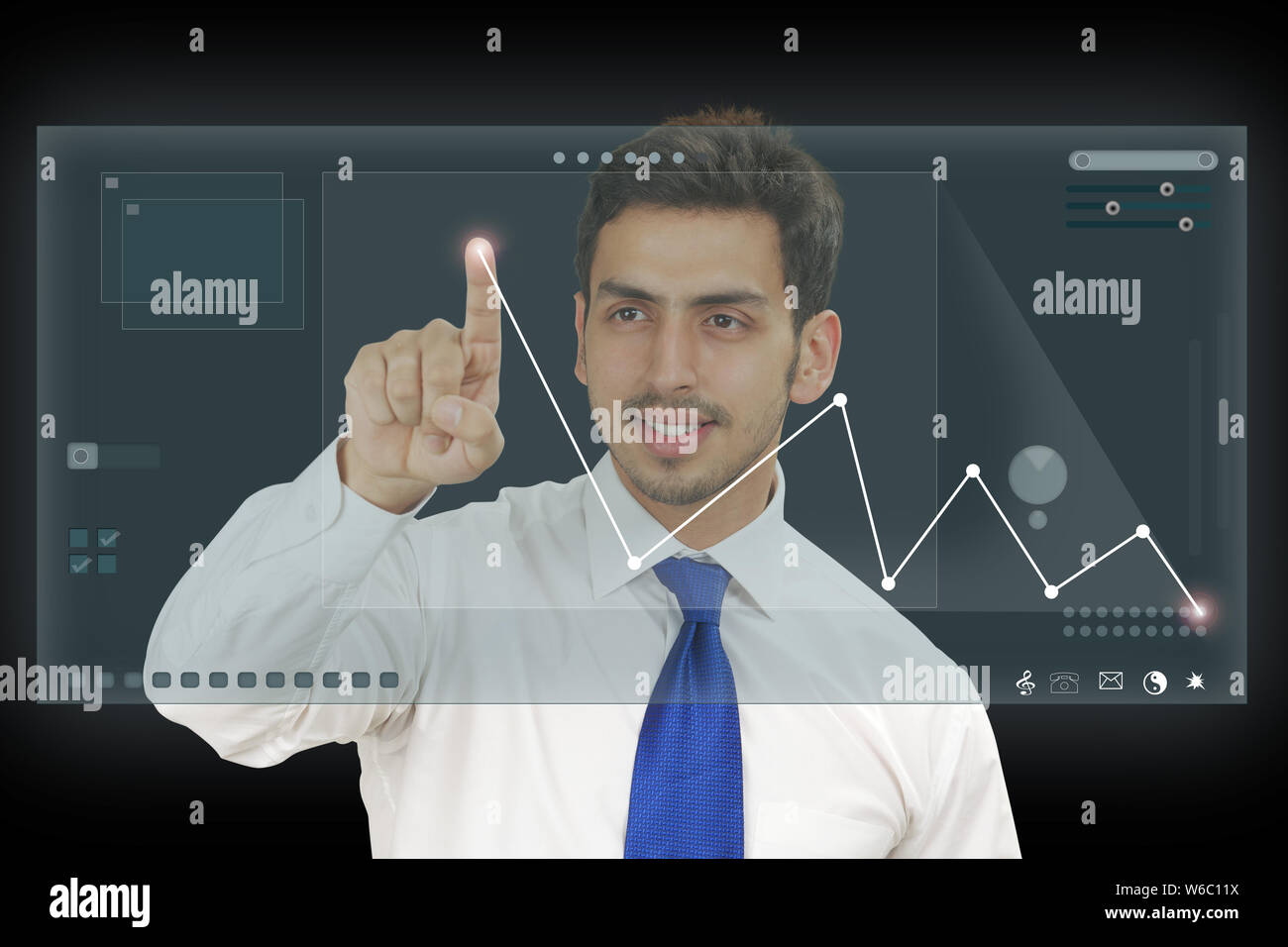 Businessman using futuristic touch screen Stock Photo - Alamy Businessman using futuristic touch screen Stock Photo - Alamy