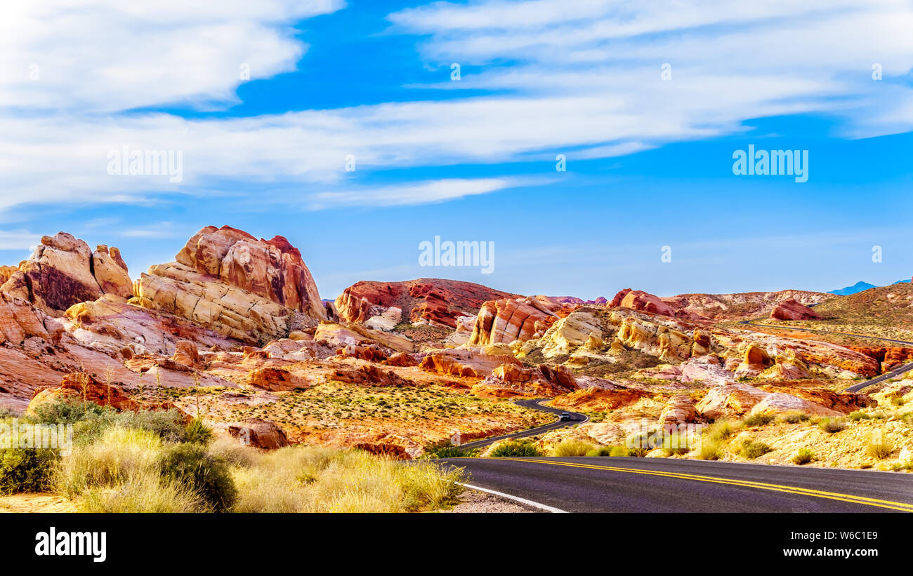The White Dome Road winds through the colorful red, yellow and white ...