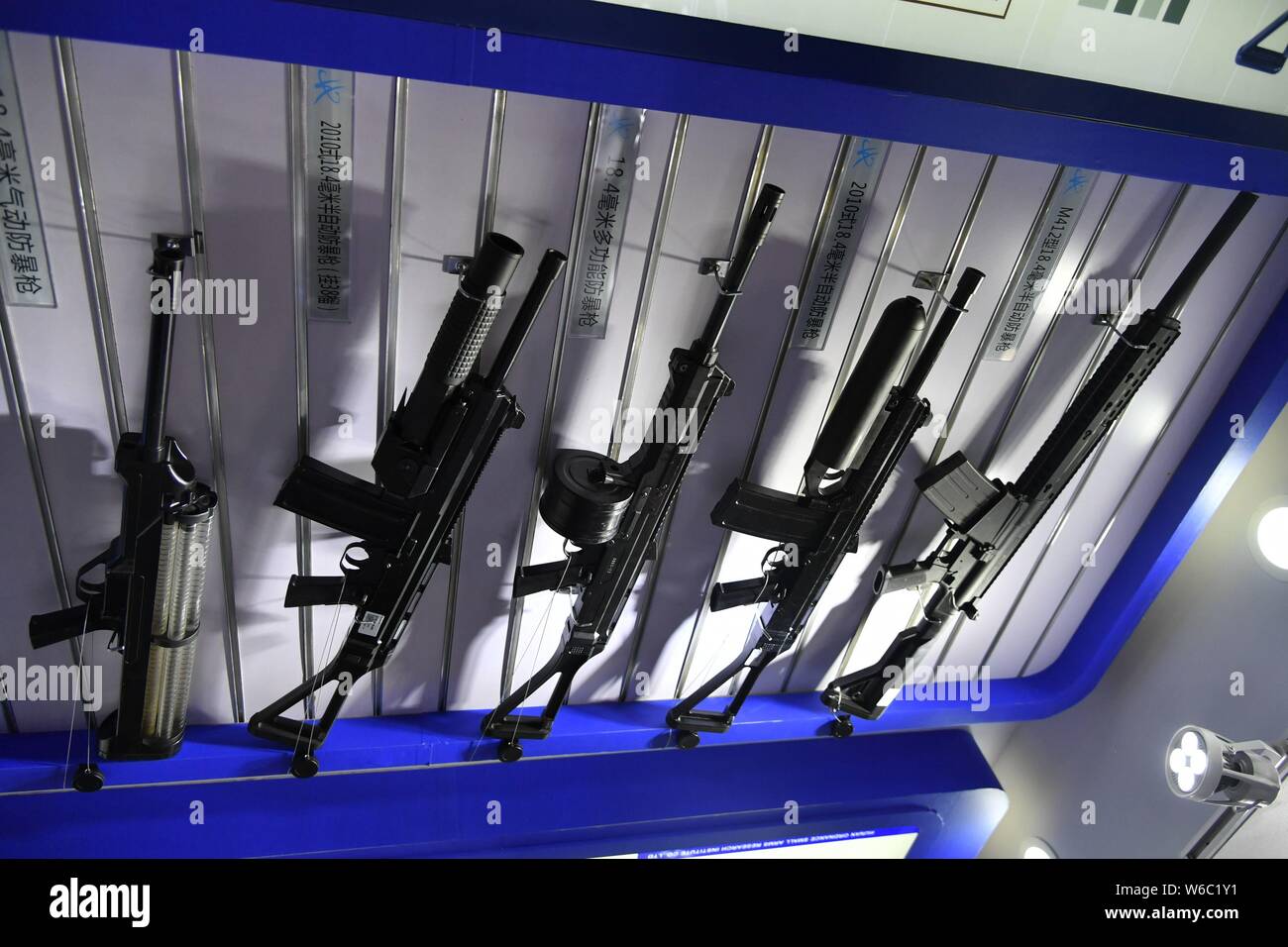 Anti-riot guns are on display during the 9th China International ...