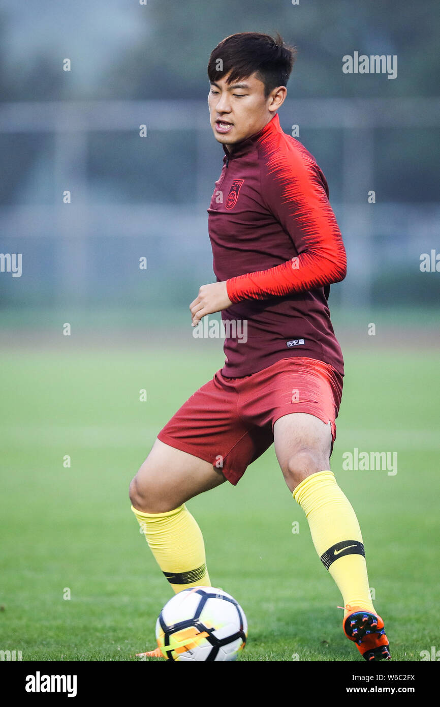 He Chao of the Chinese national men's football team takes part in a ...