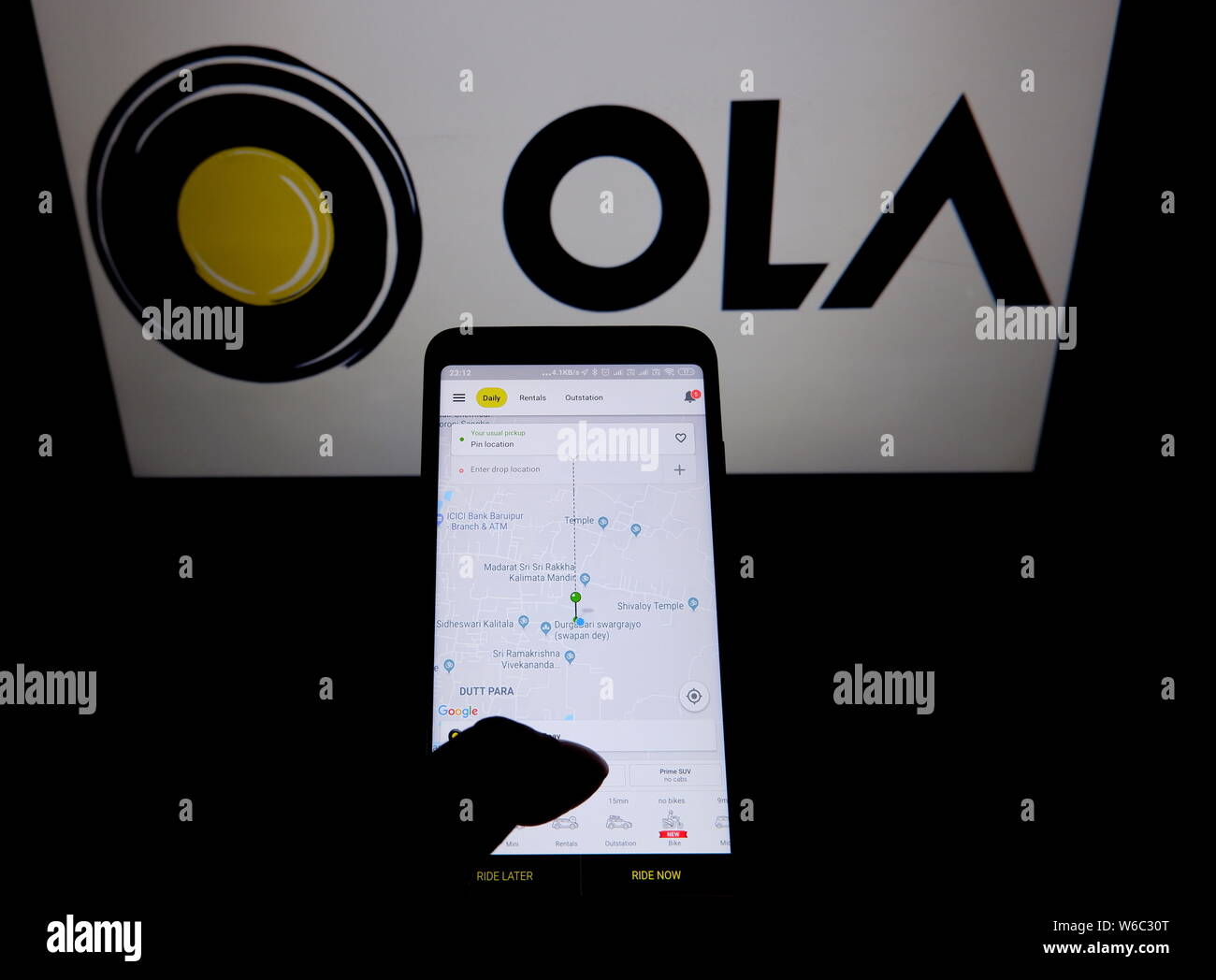 In this photo illustration a popular Transport application company OLA ...