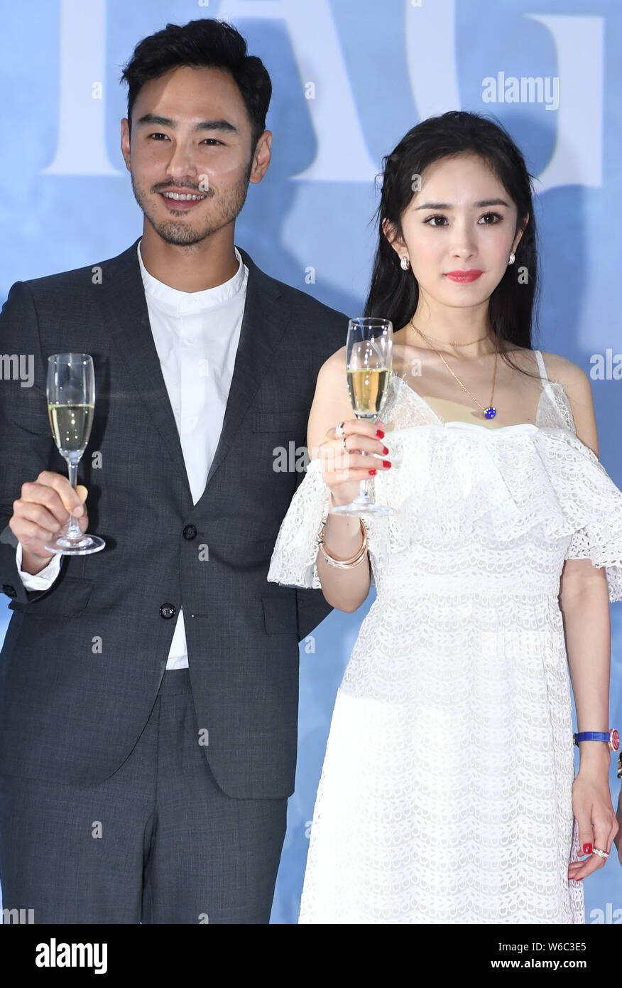 Chinese actress Yang Mi, right, and Taiwanese actor and model Ethan ...