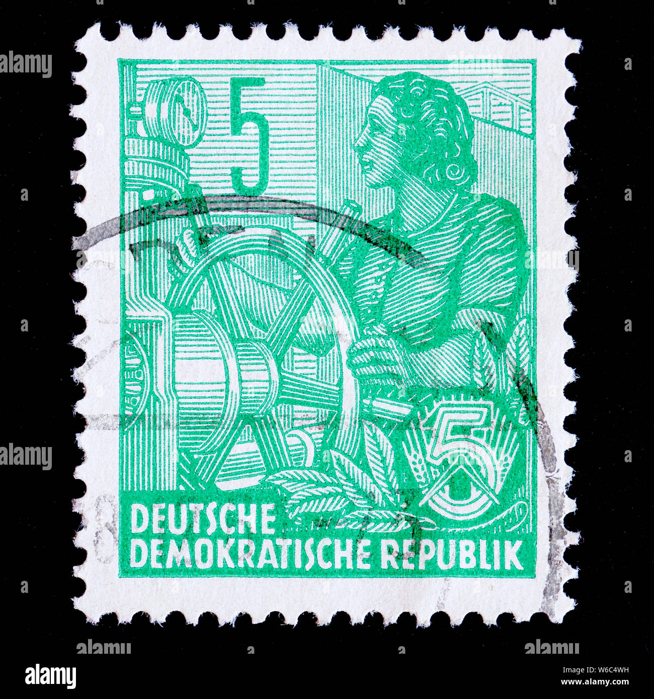 East Germany postage stamp - Woman at the steering wheel Stock Photo ...