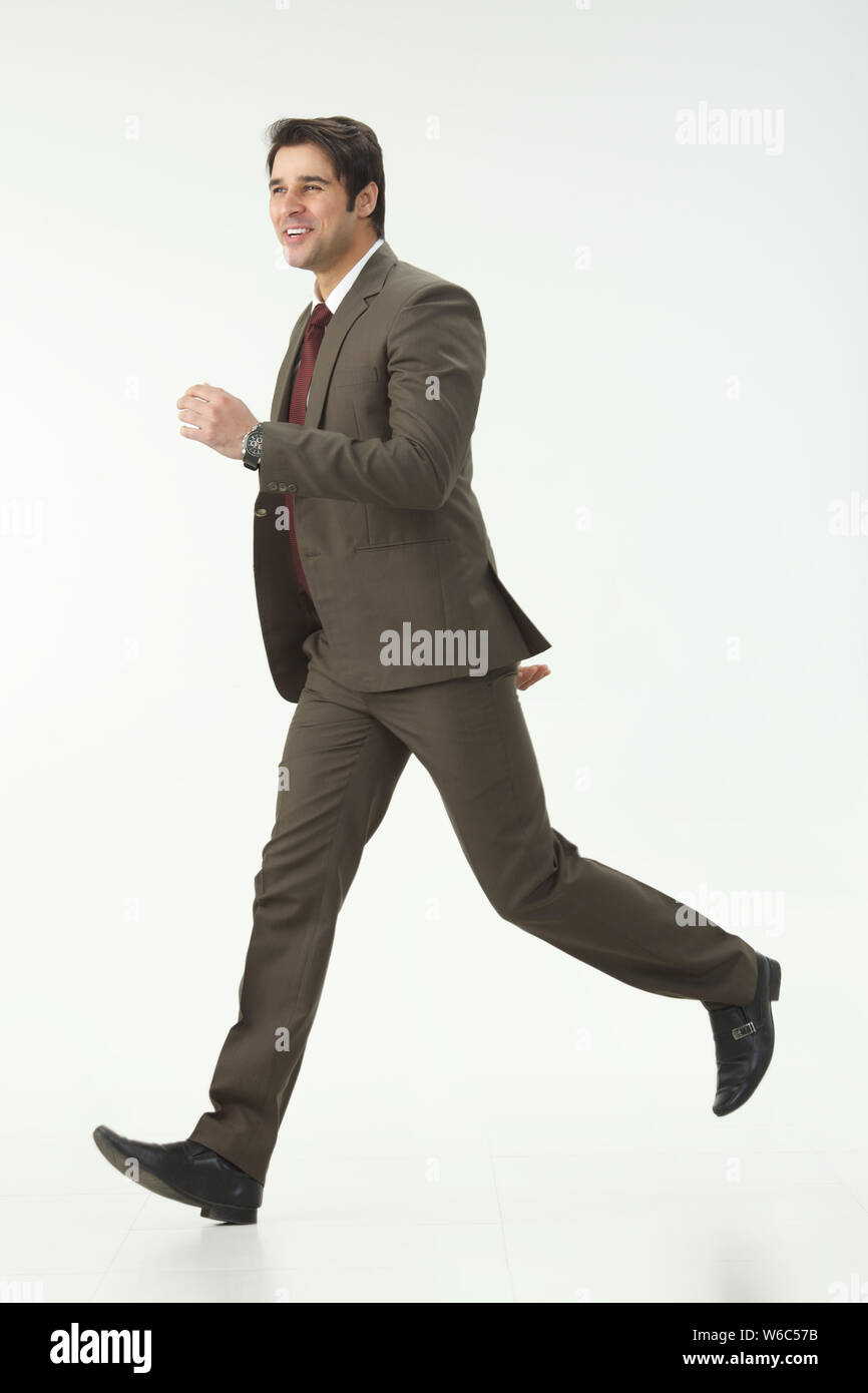 Man suit running away hi-res stock photography and images - Alamy