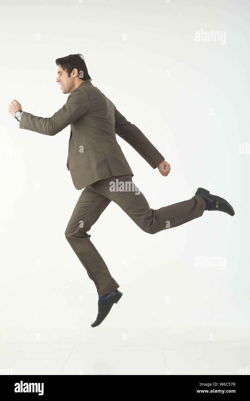 Businessman running away isolated hi-res stock photography and images ...