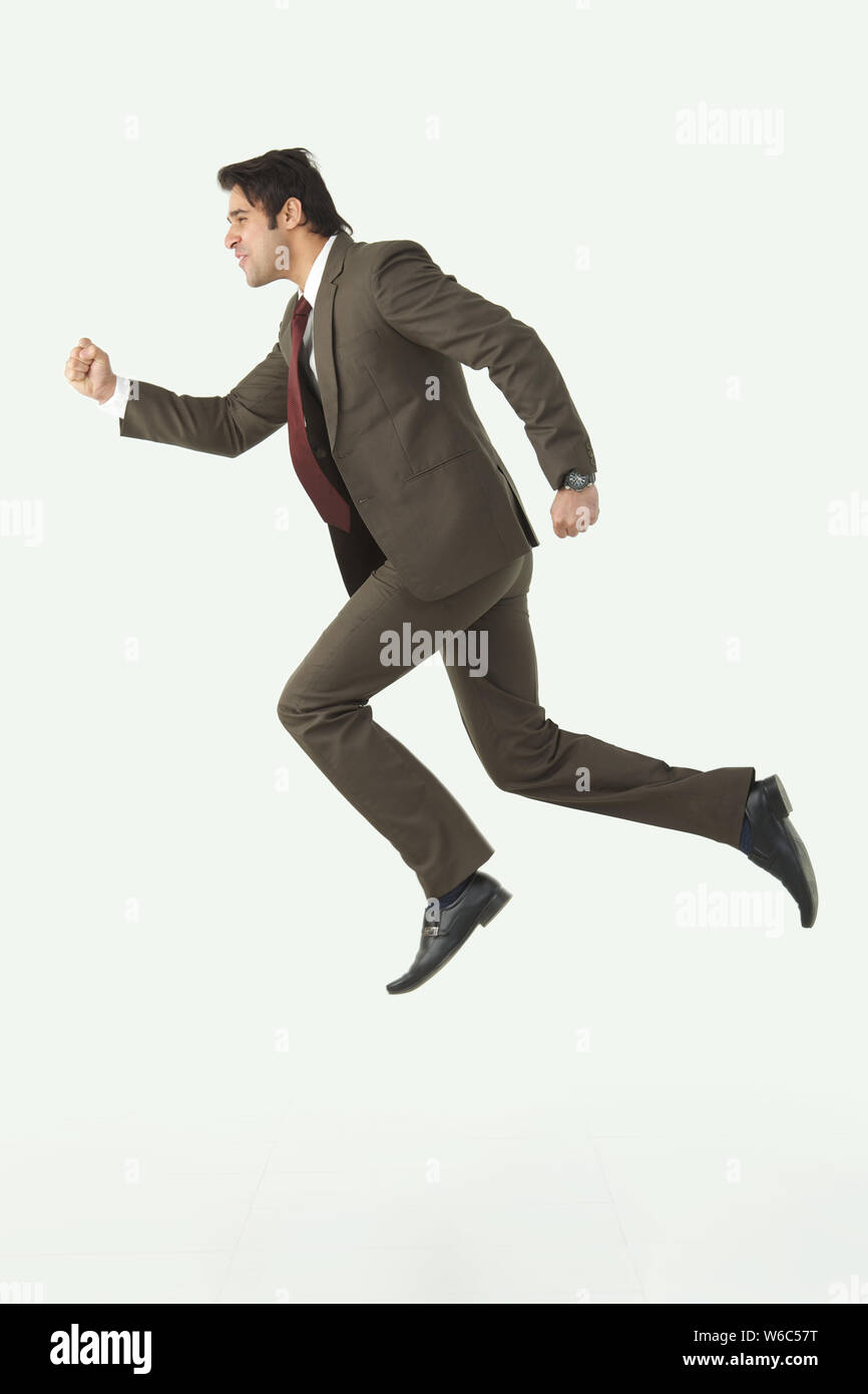 Man suit running away hi-res stock photography and images - Alamy